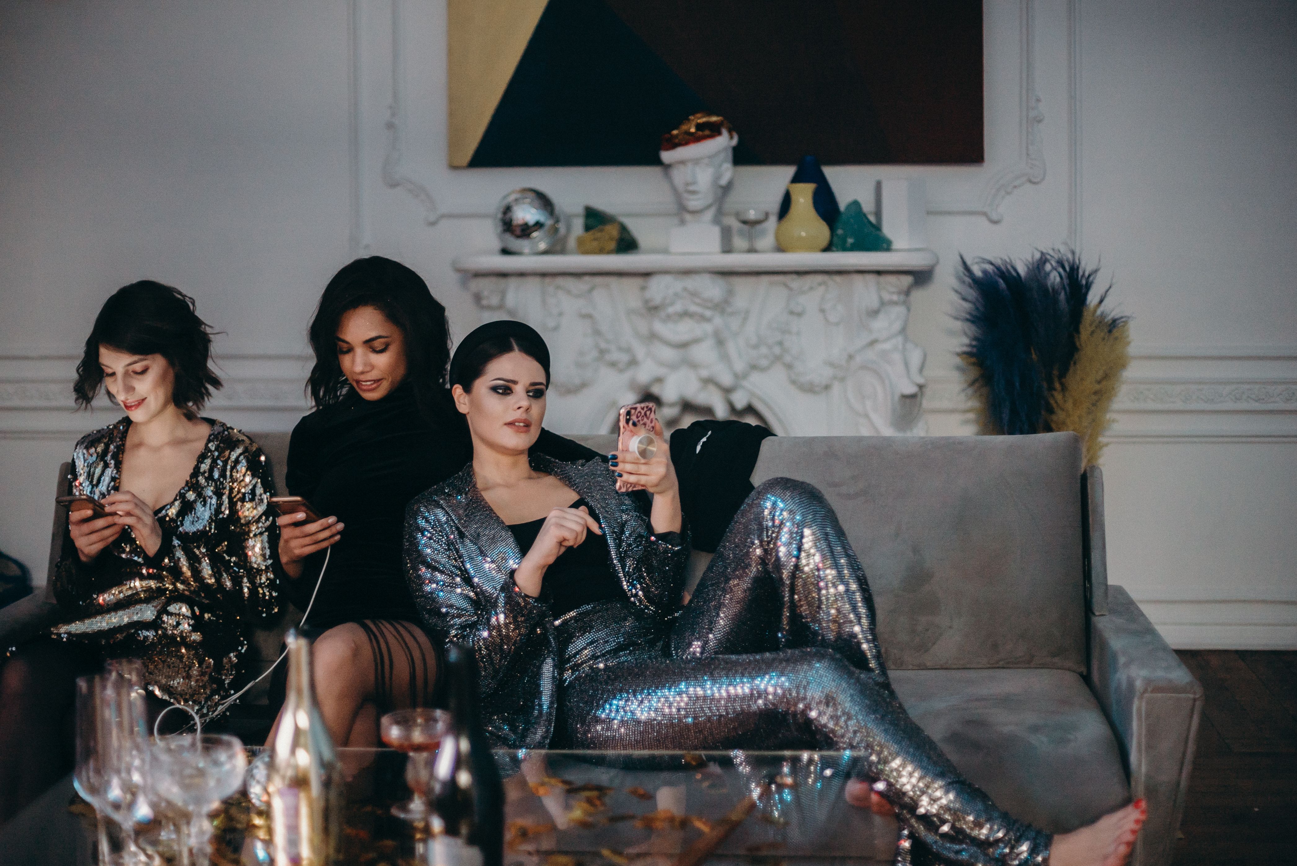 Women Sitting on Sofa · Free Stock Photo
