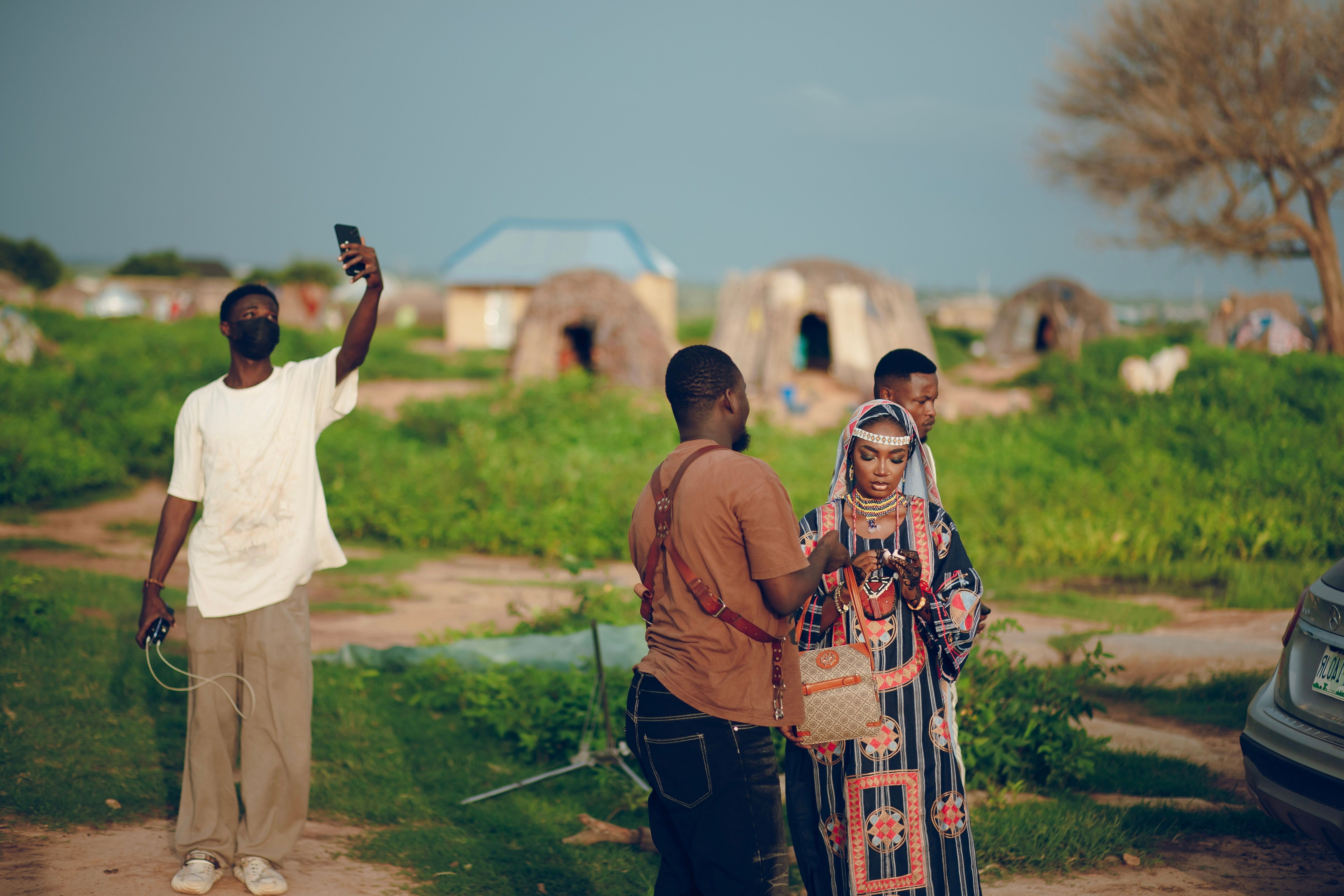 Group in Traditional Clothing Outdoors in Village · Free Stock Photo