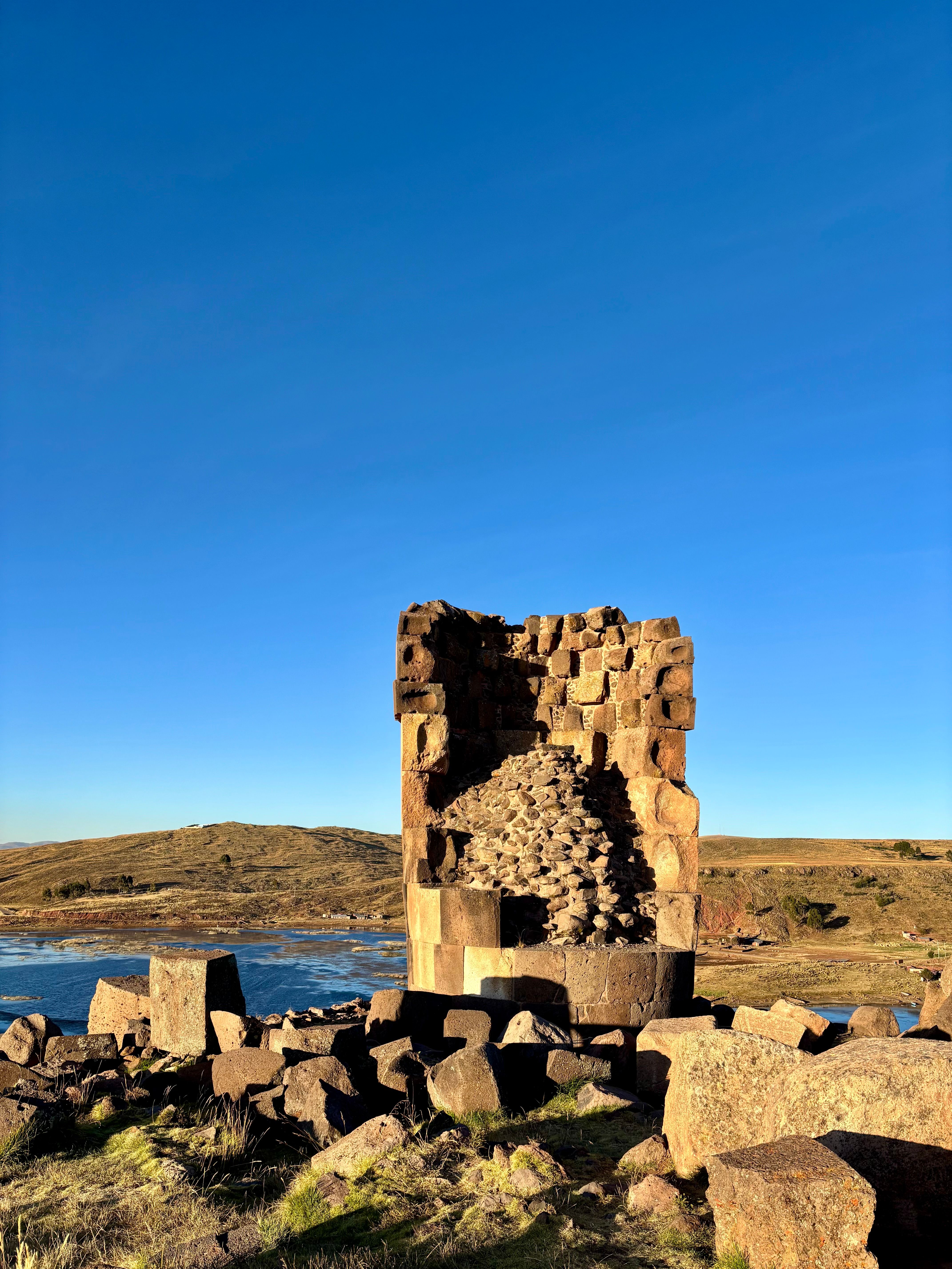 Ancient Inca Ruins by Lake in Peru · Free Stock Photo