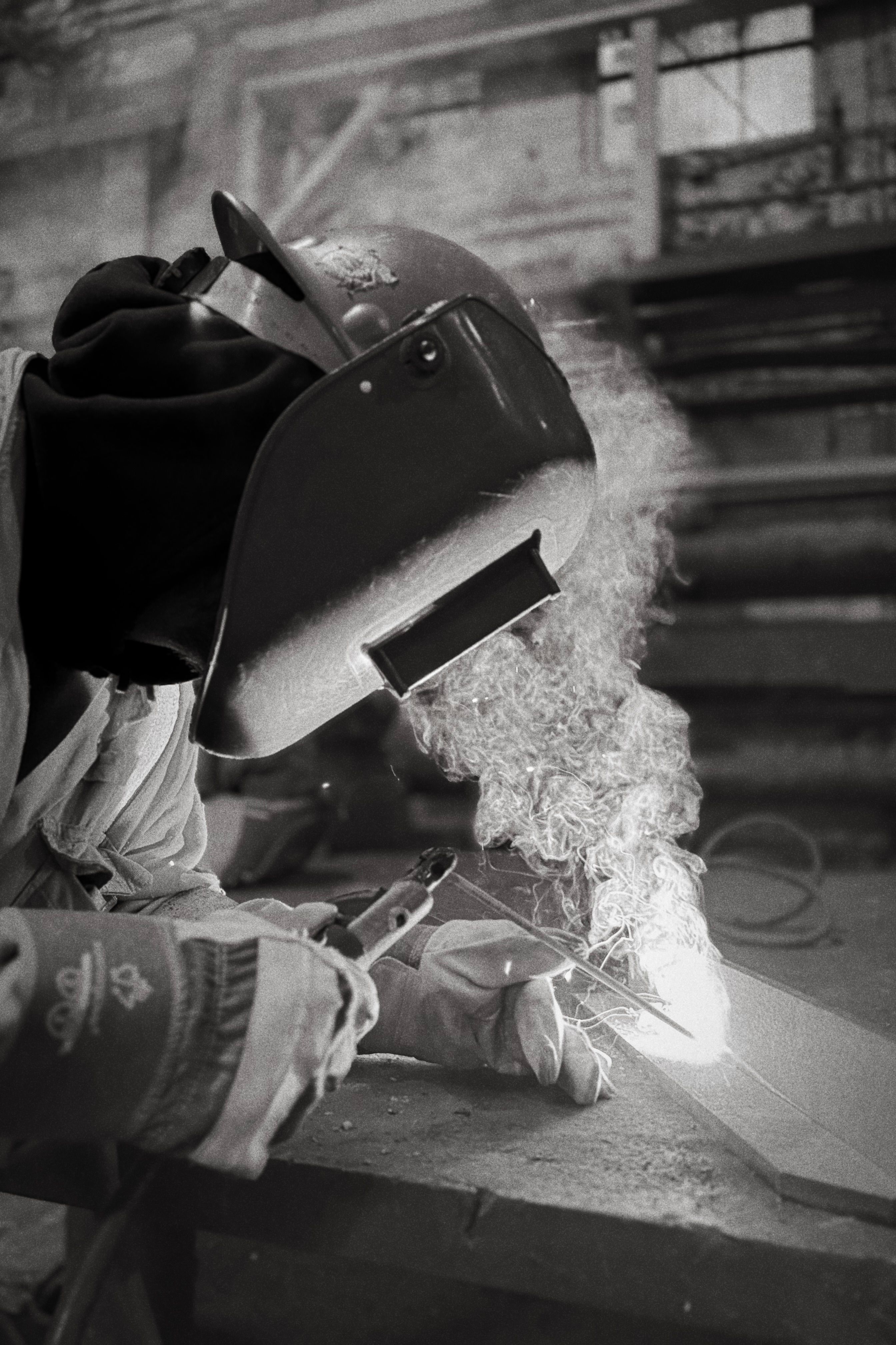 Industrial Welder in Action with Safety Gear · Free Stock Photo