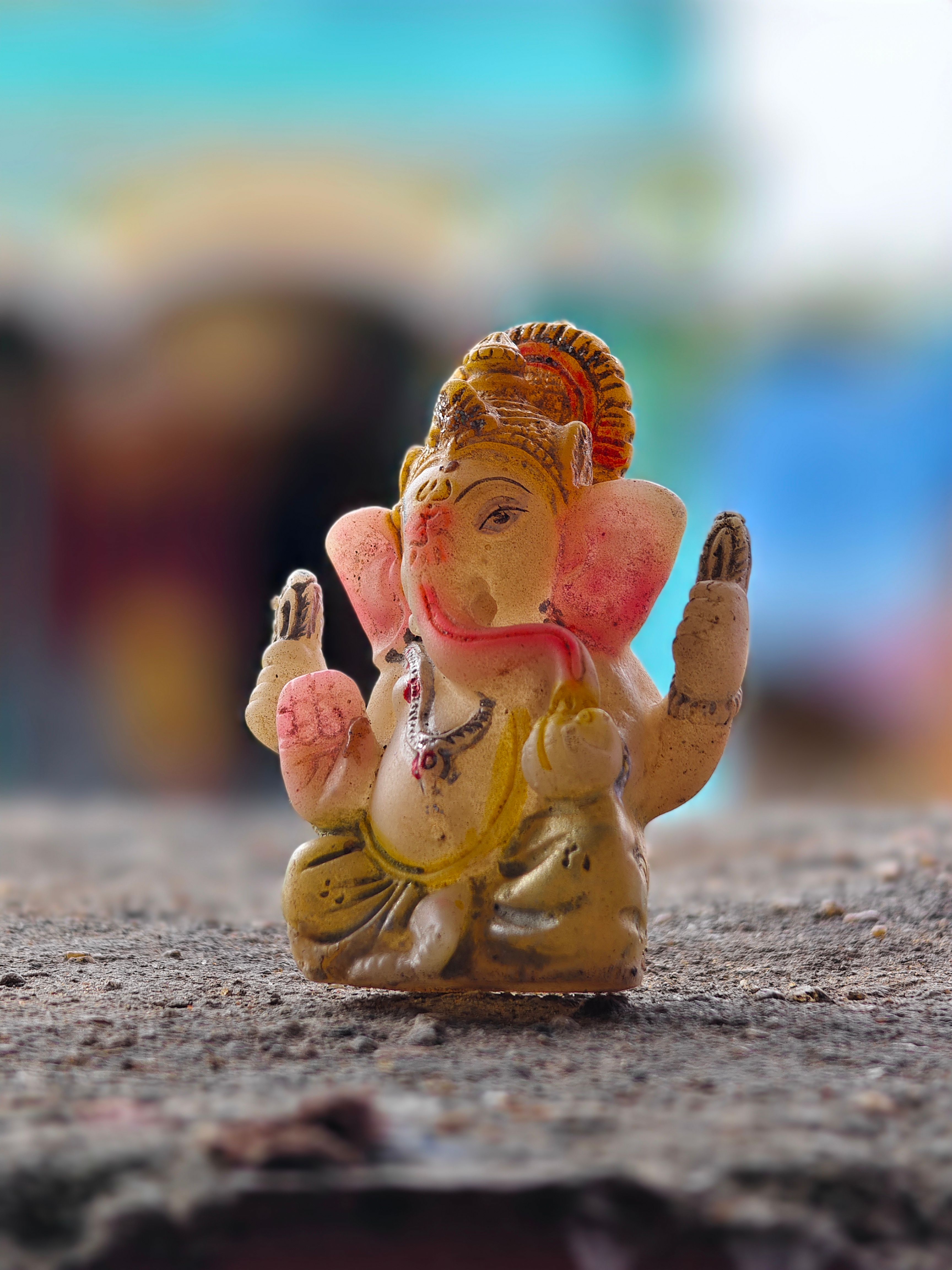 Colorful Ganesha Statue Against Blurred Background · Free Stock Photo