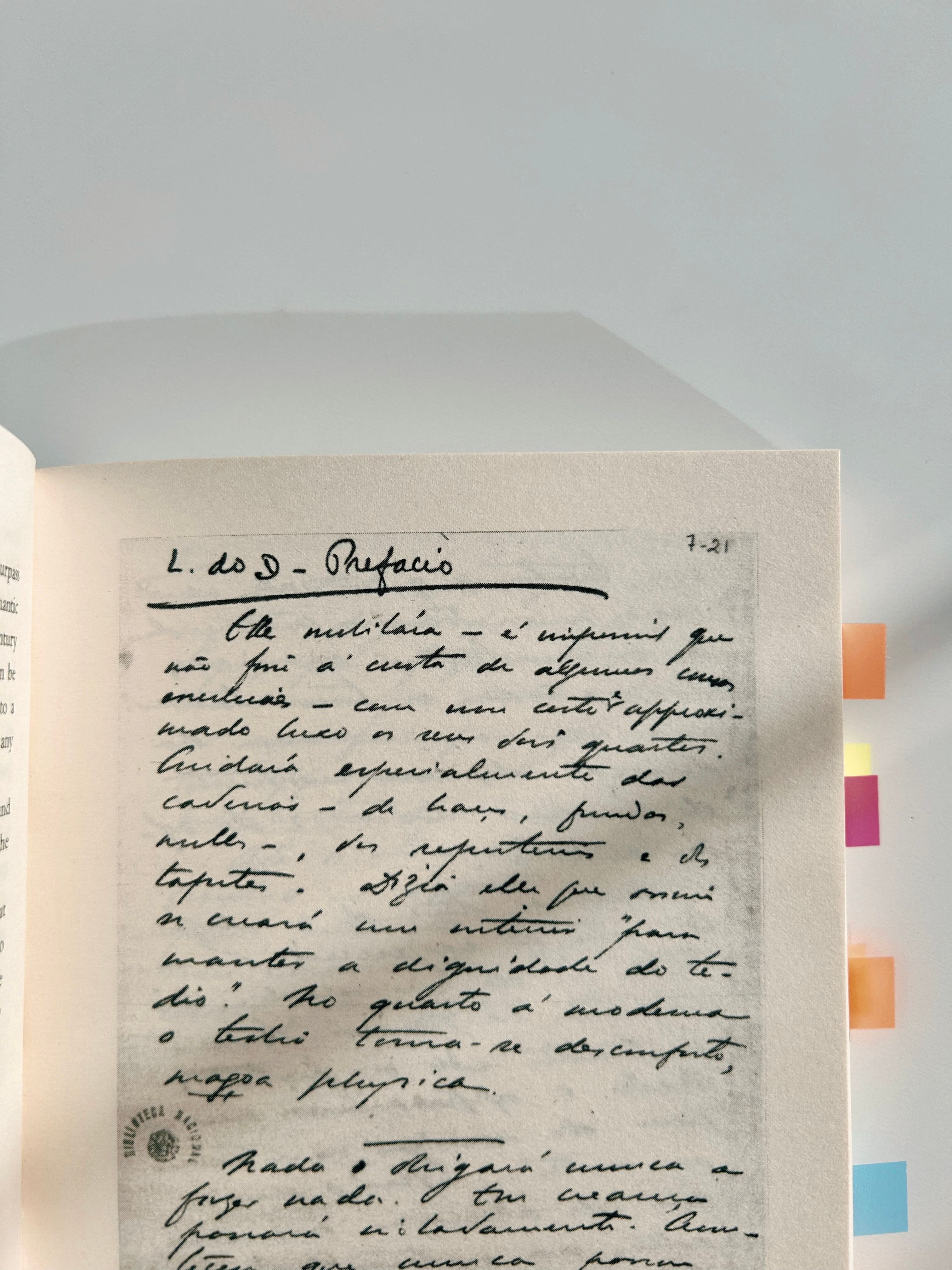 Open Book with Handwritten Notes and Colorful Tabs · Free Stock Photo