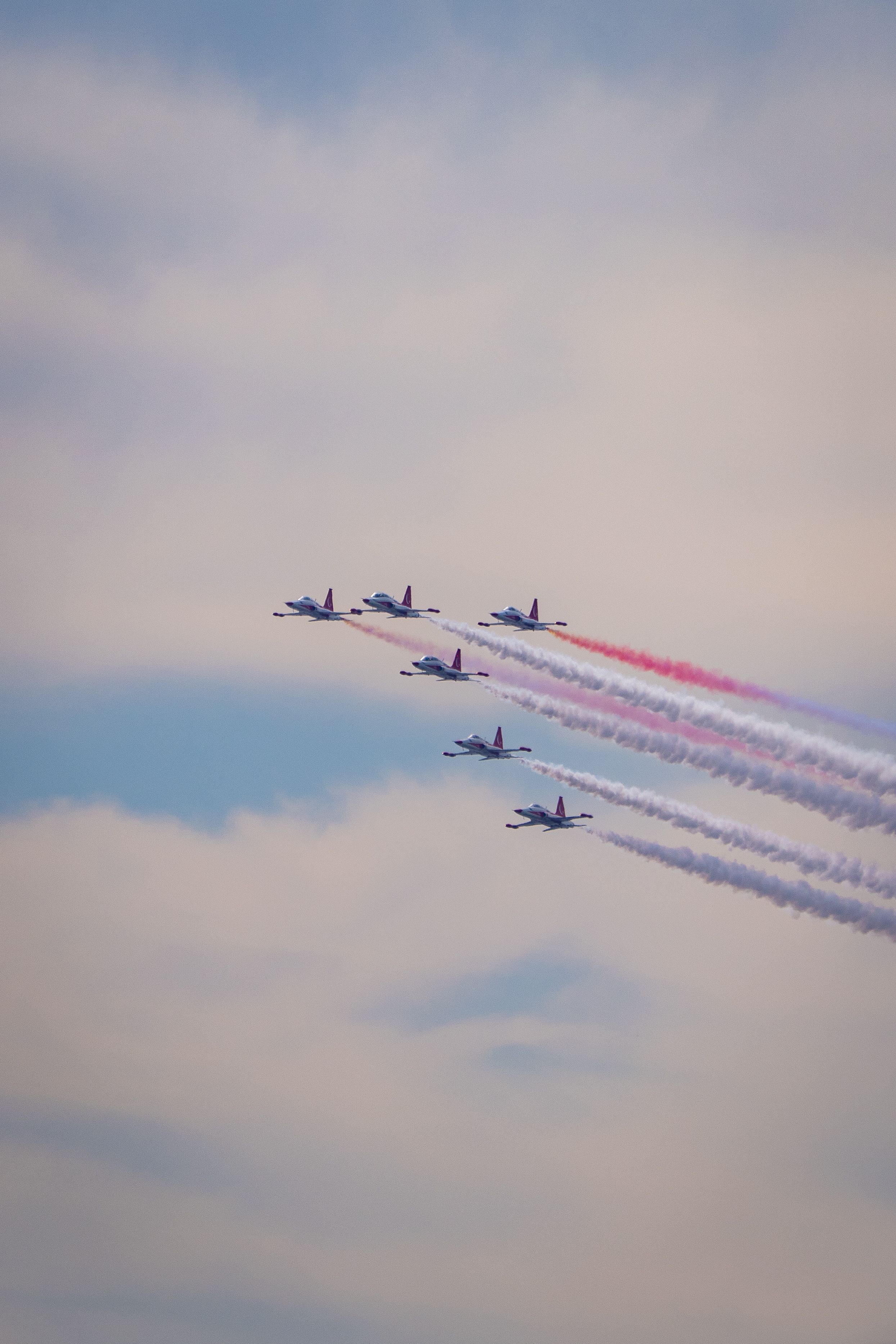 Aerobatic Jet Formation with Colorful Contrails · Free Stock Photo