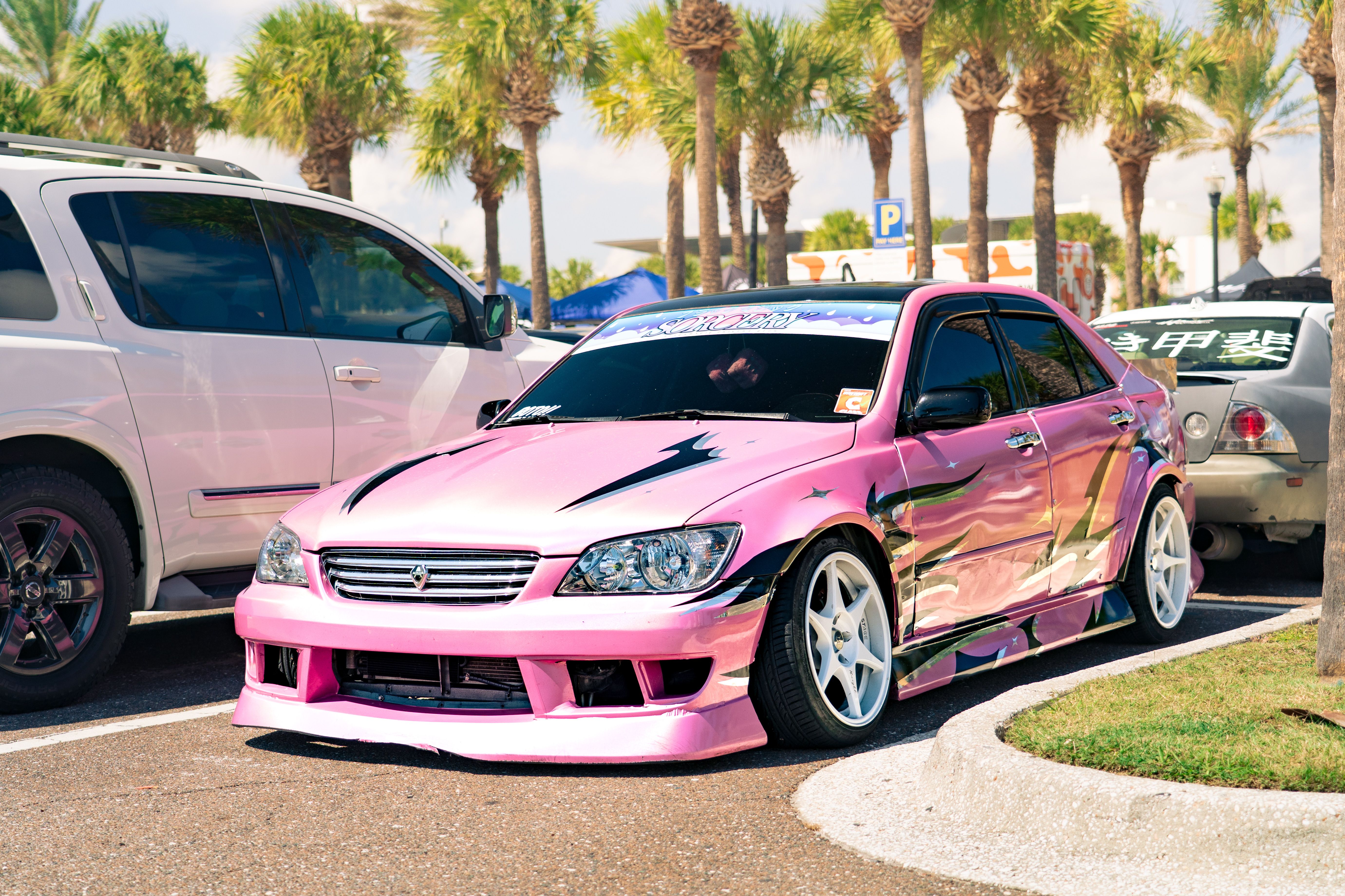 Pink Custom Car at Outdoor Auto Show · Free Stock Photo