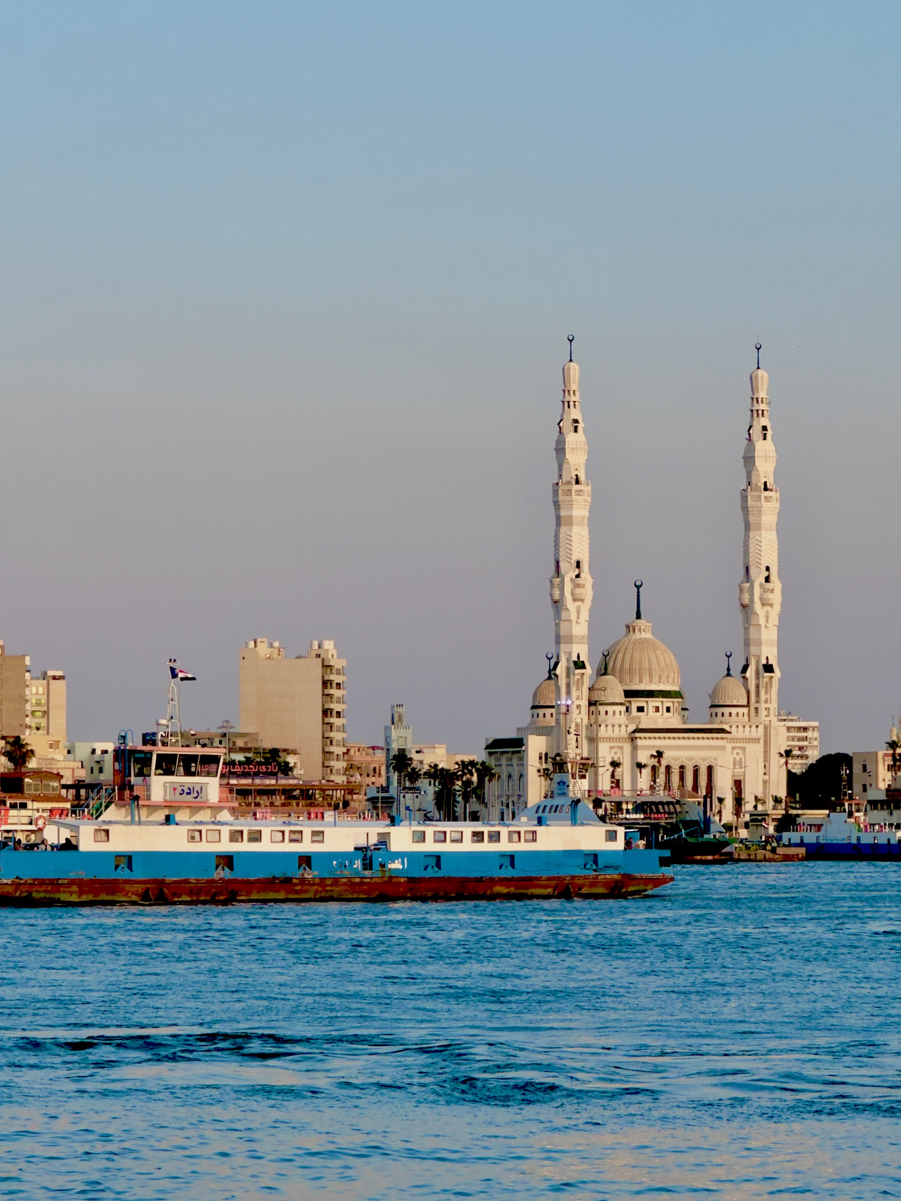 Port Said Harbor with Mosque and Ferry in View · Free Stock Photo