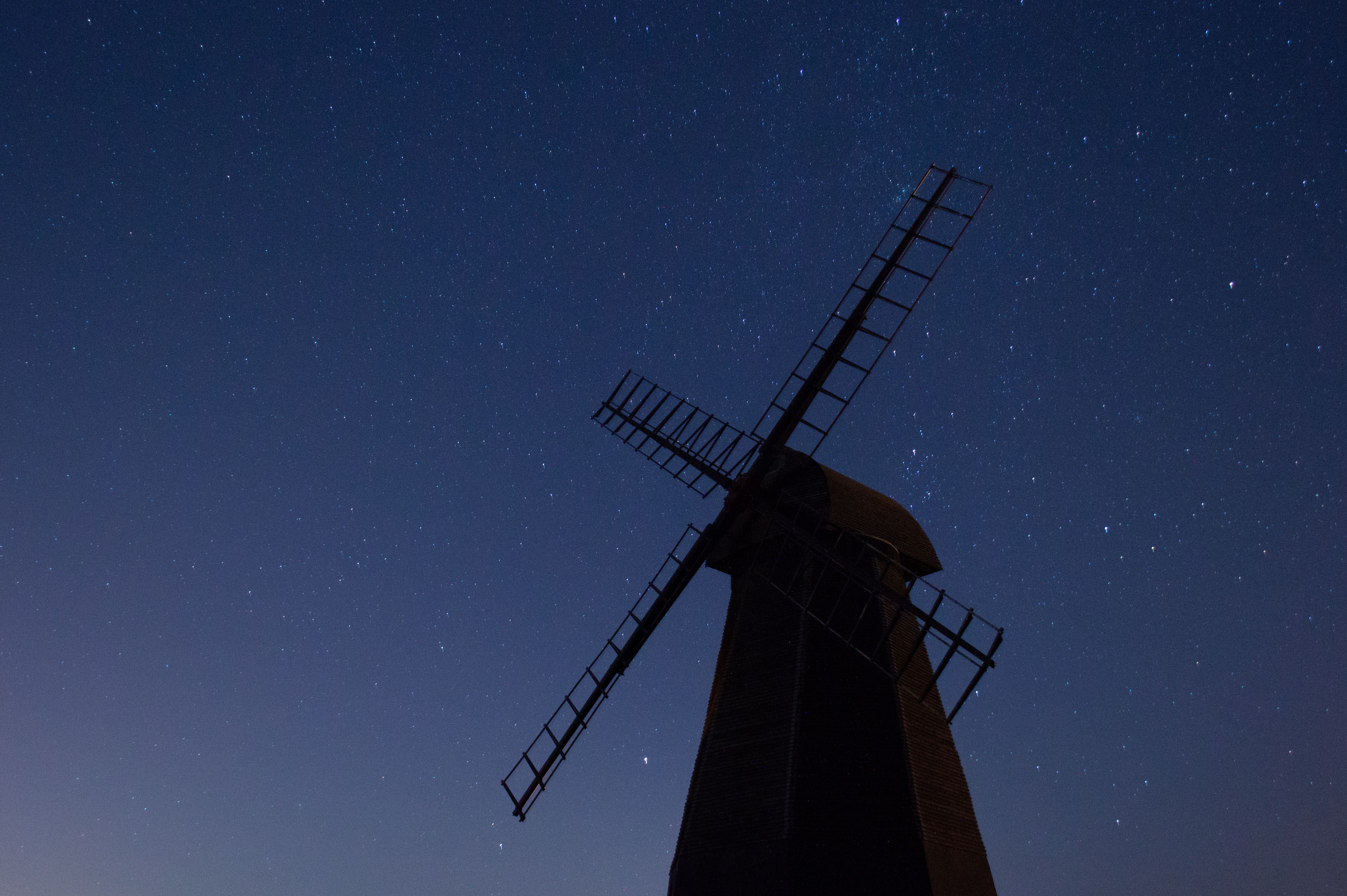 Silhouette of Windmill Against Starry Night · Free Stock Photo