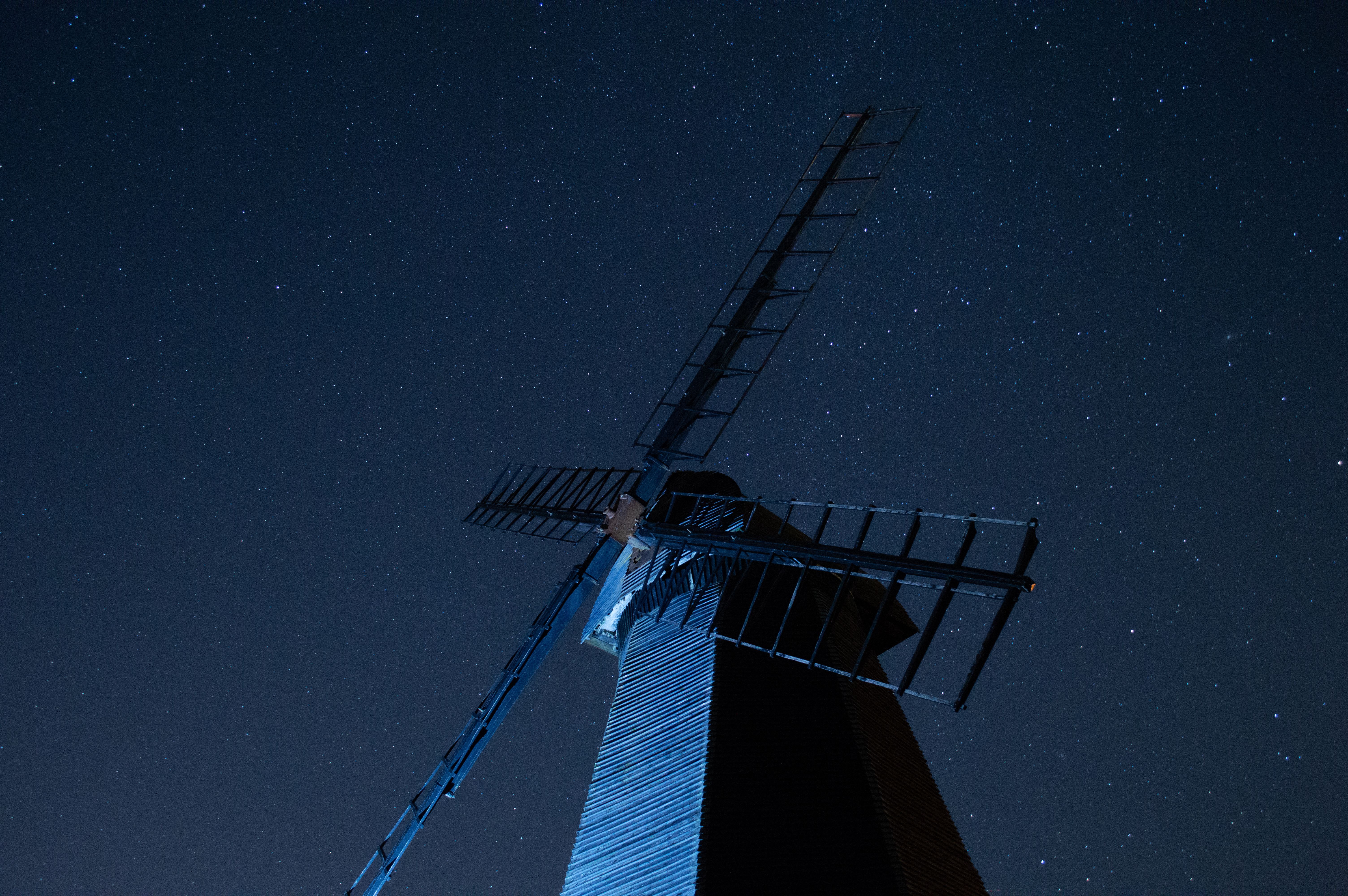 Starlit Night Sky with Silhouette Windmill · Free Stock Photo