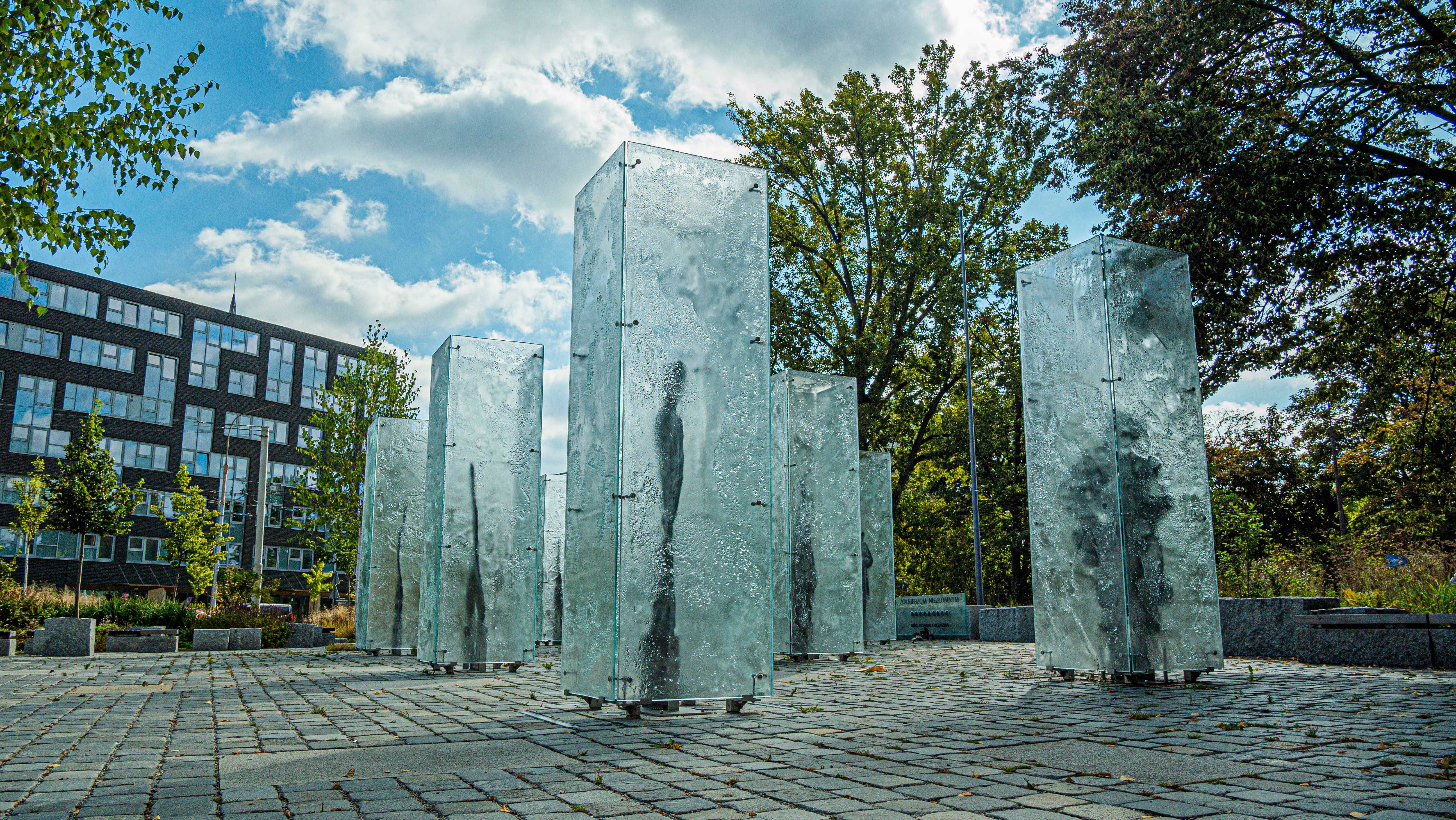 Modern Glass Monument in Urban Park Setting · Free Stock Photo