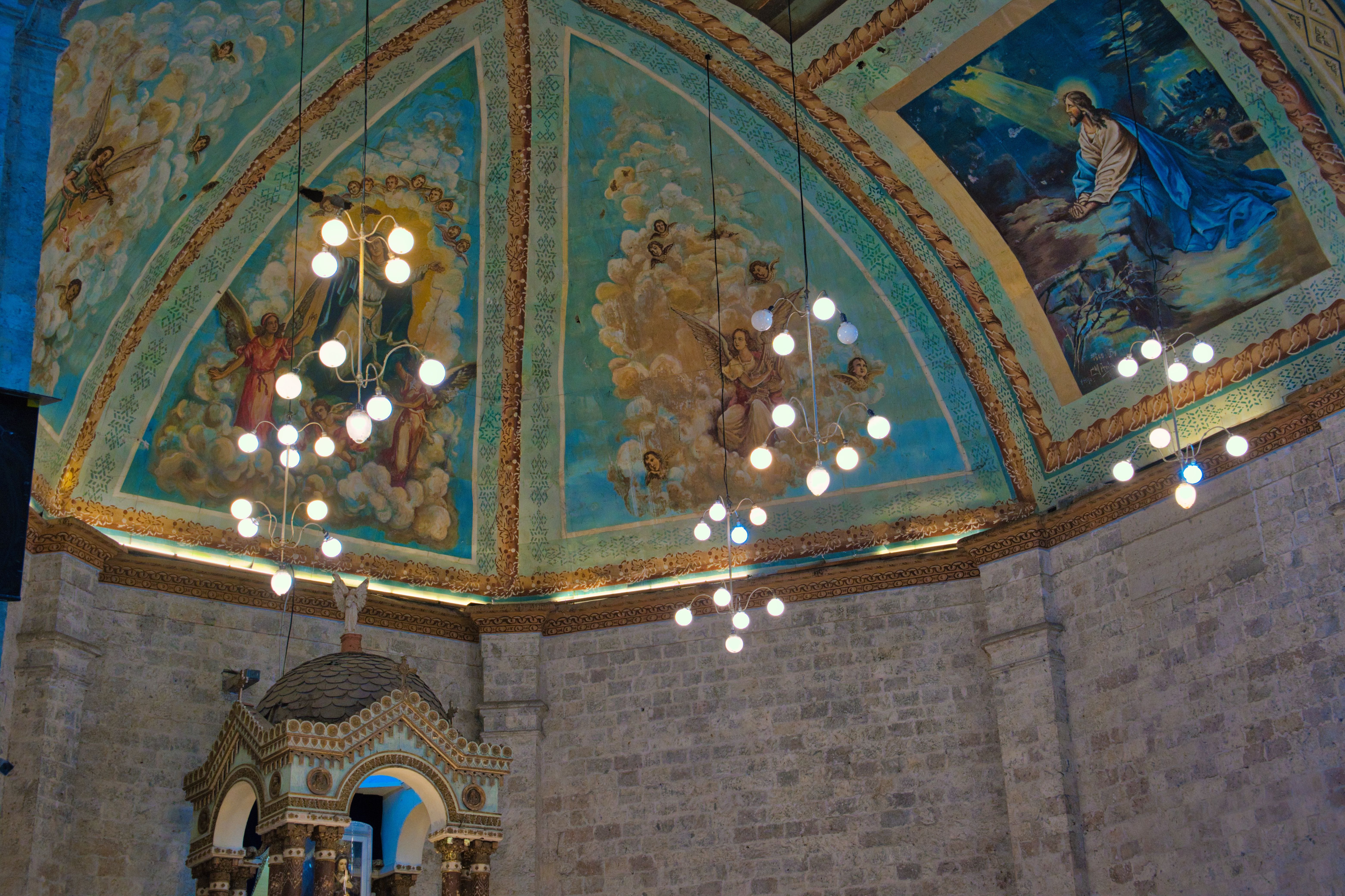 Ornate church ceiling with frescoes and lighting · Free Stock Photo