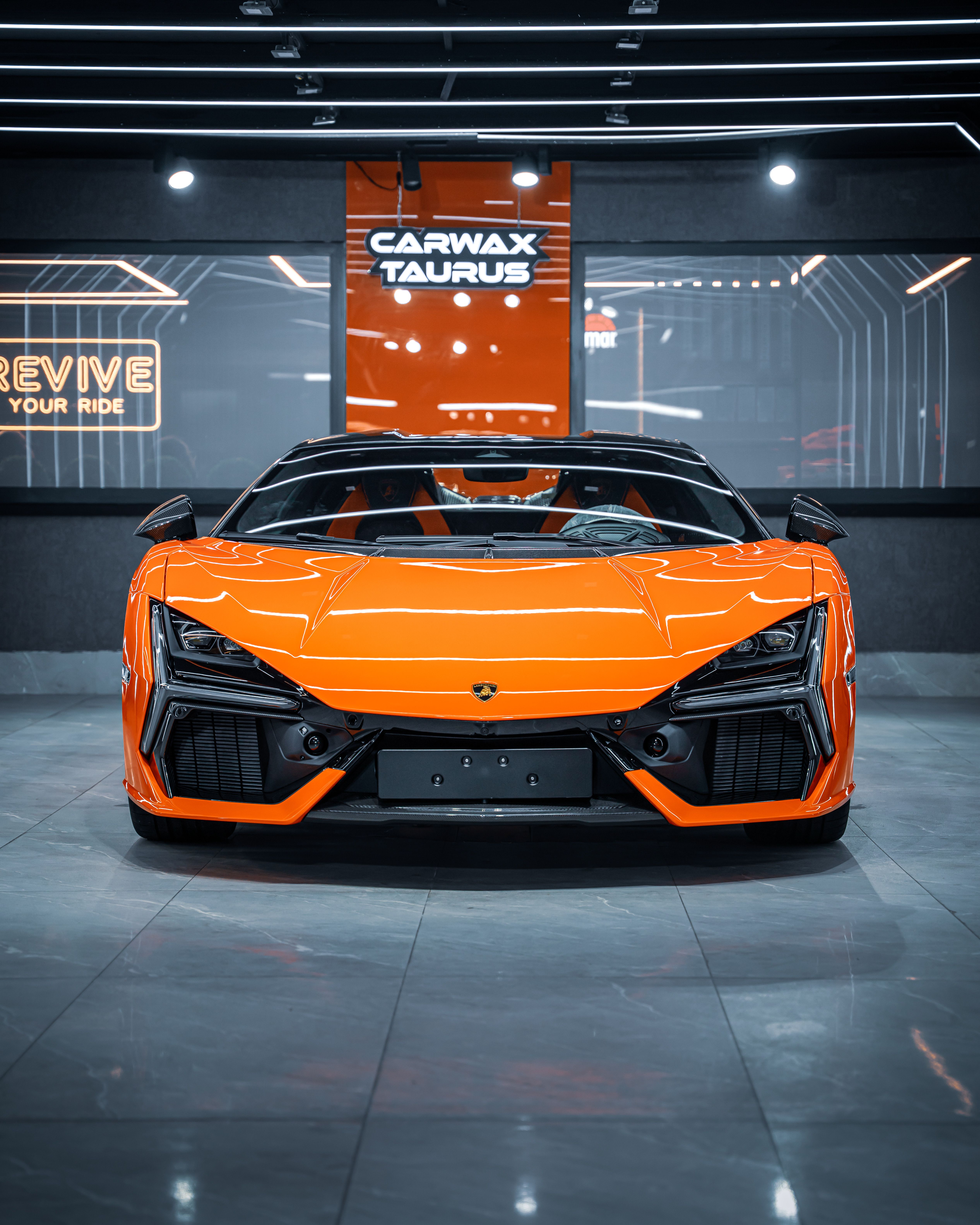 Sleek Orange Sports Car in Showroom, Ankara, Türkiye · Free Stock Photo