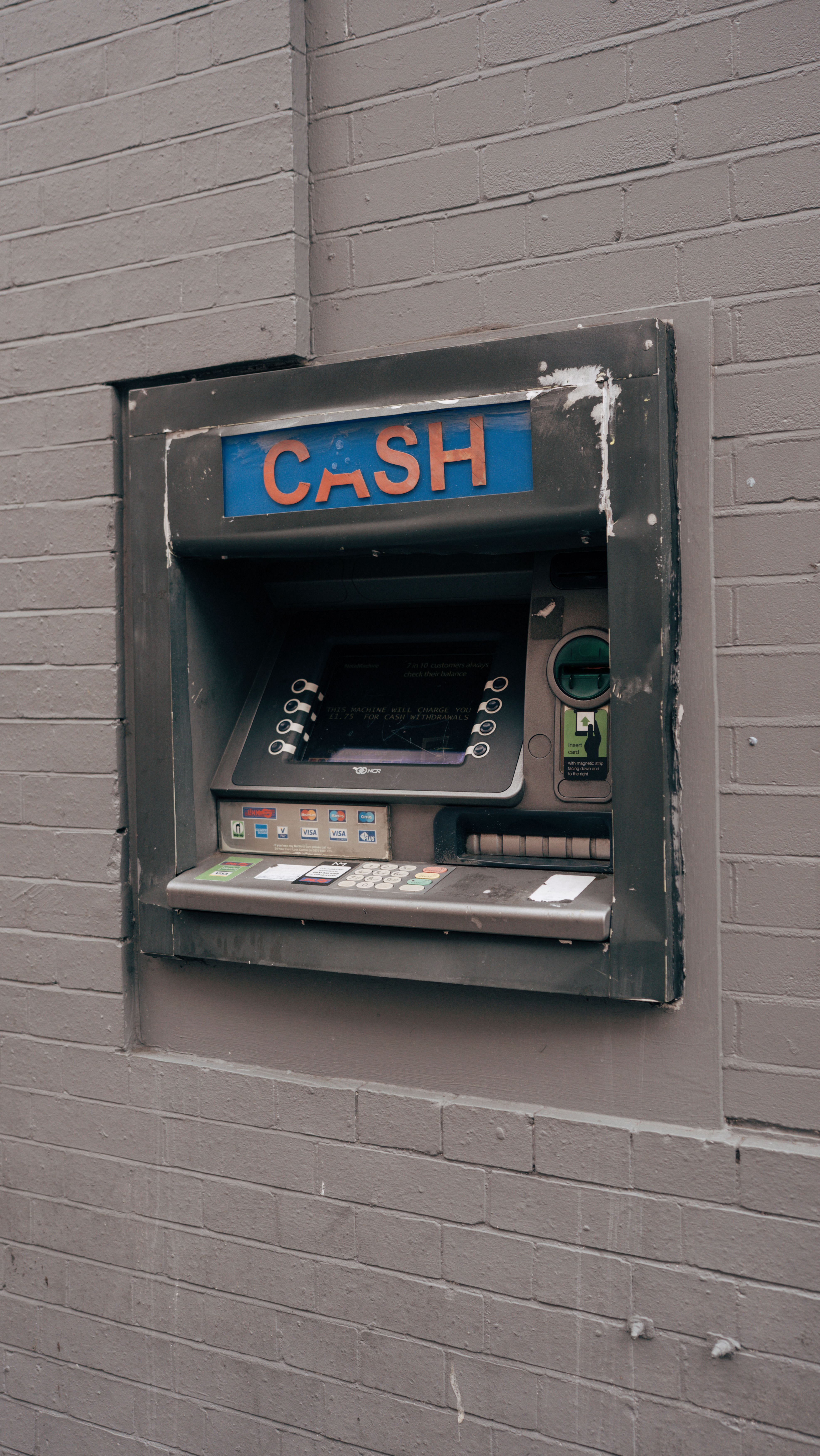 Old ATM Machine Built into Brick Wall · Free Stock Photo