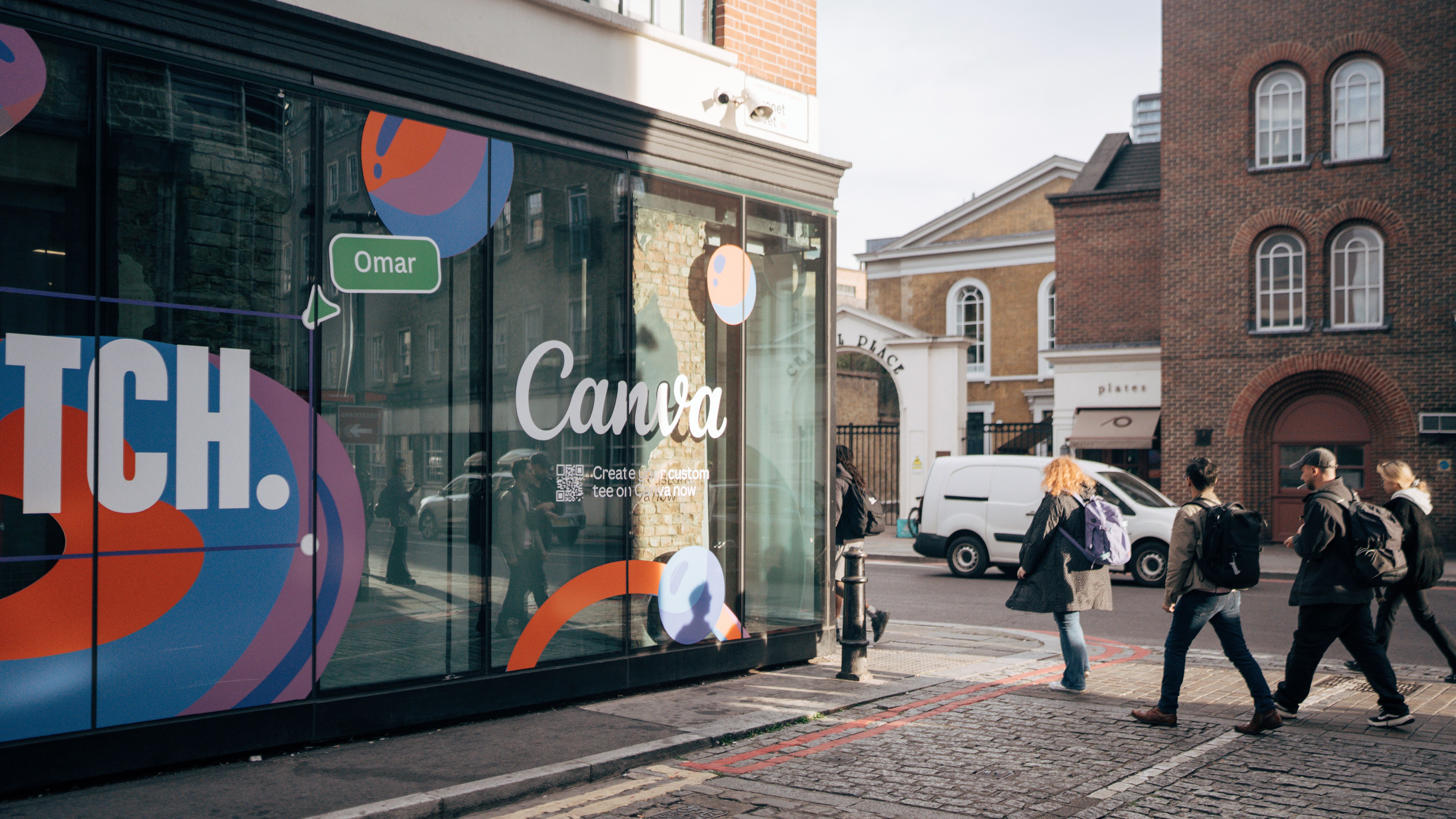 People walking past colorful store window in city · Free Stock Photo