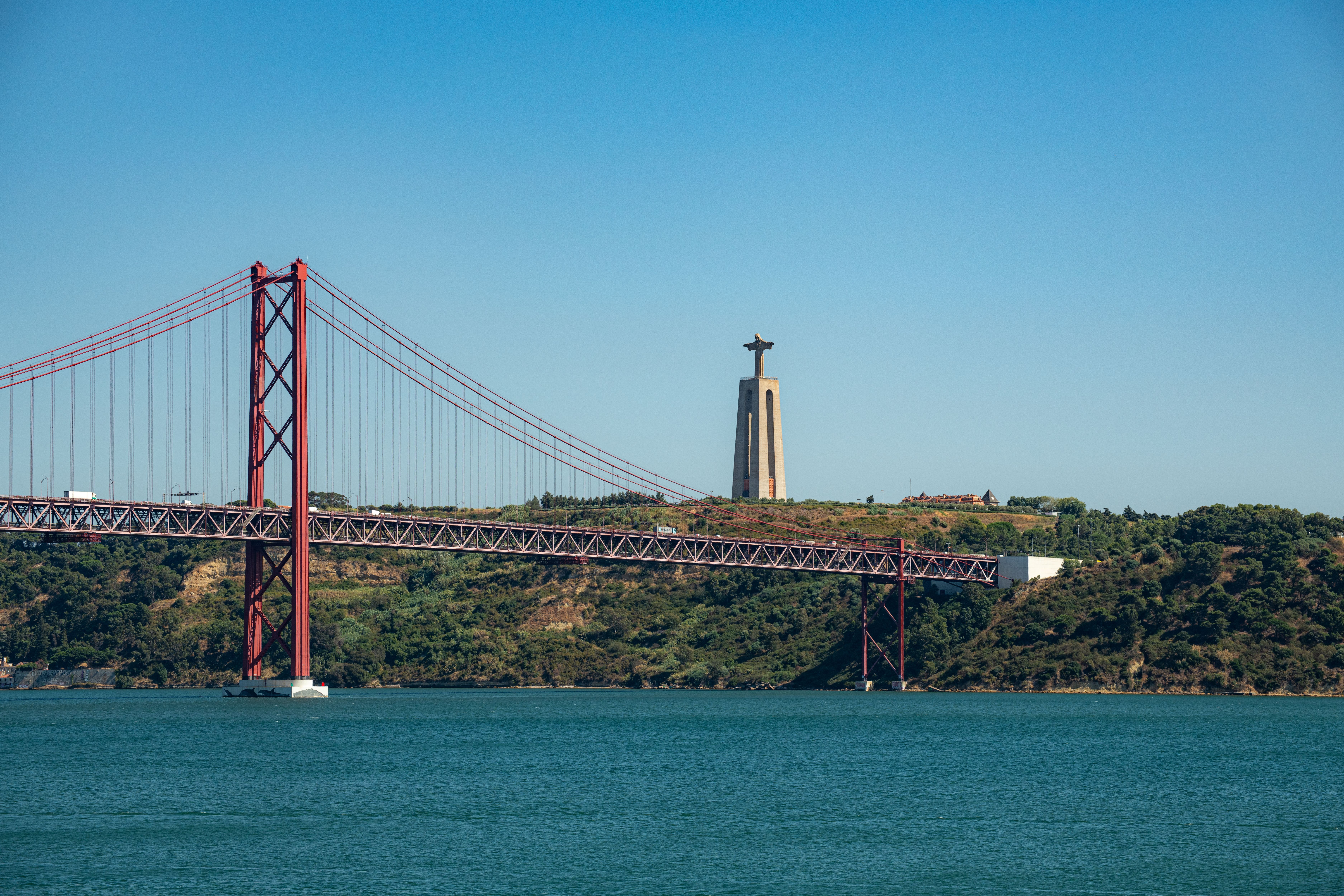 25th April Bridge and Christ the King Statue in Lisbon · Free Stock Photo