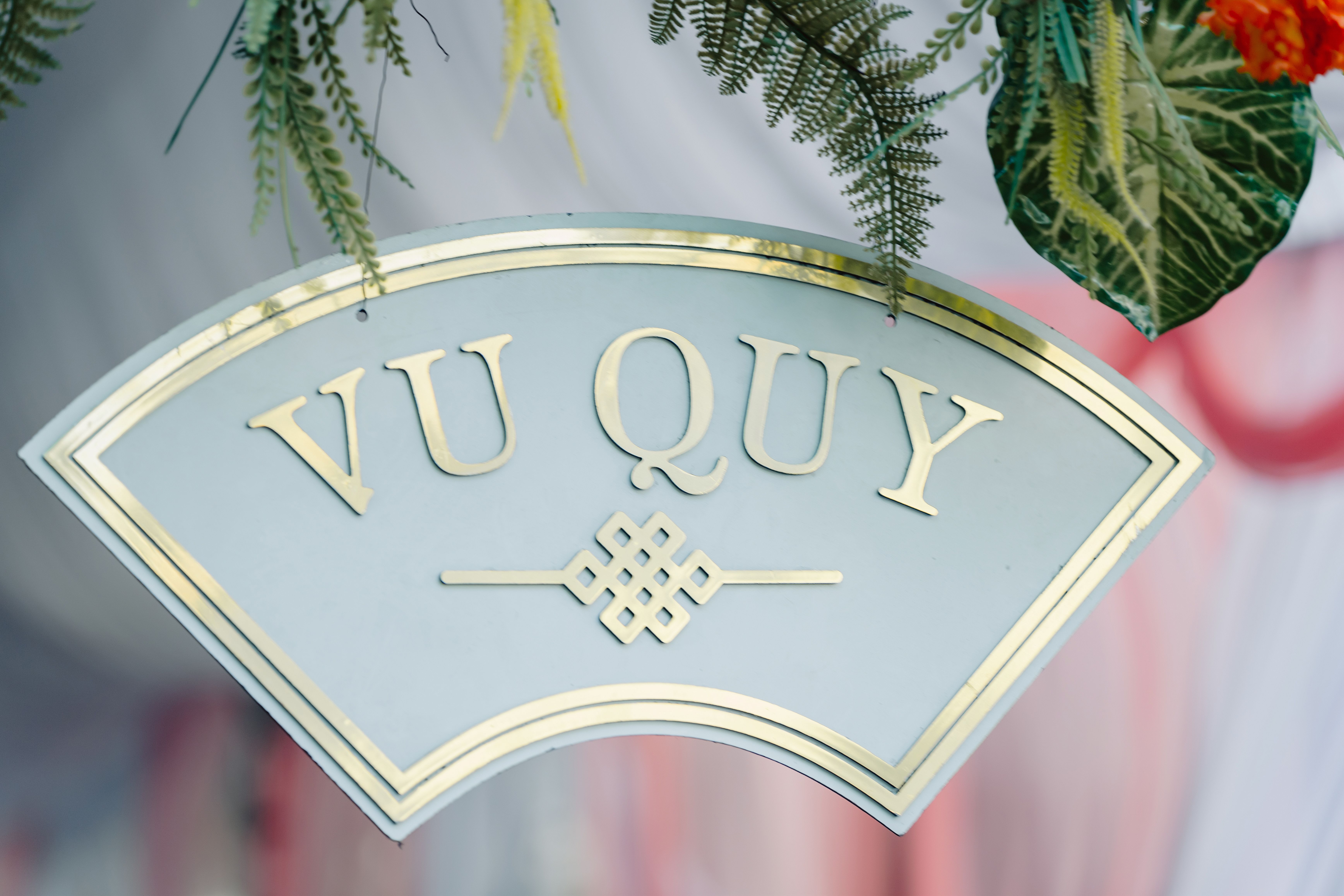 Elegant Vu Quy Wedding Sign with Floral Elements · Free Stock Photo