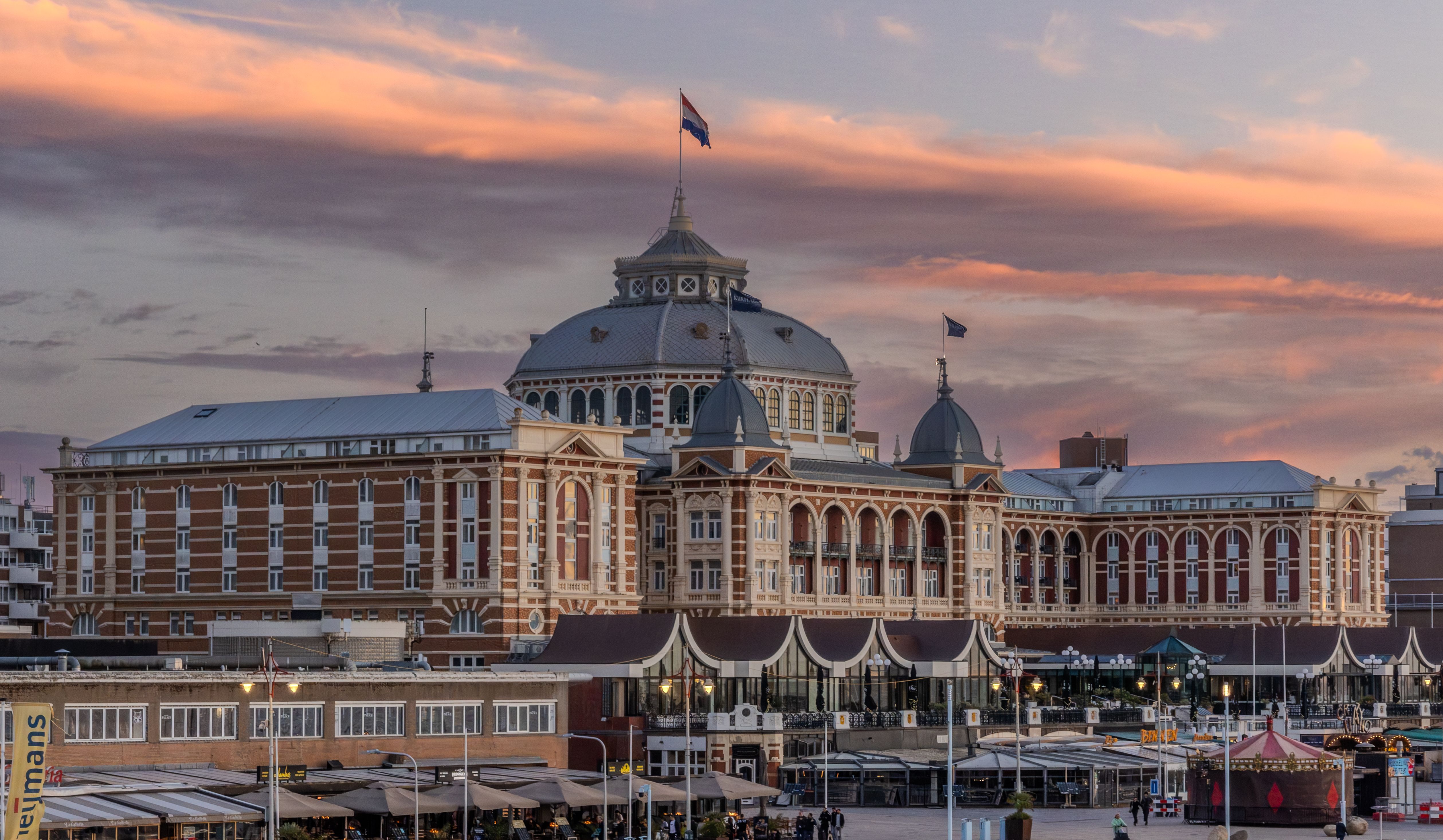 Majestic Sunset Over Kurhaus in Scheveningen · Free Stock Photo