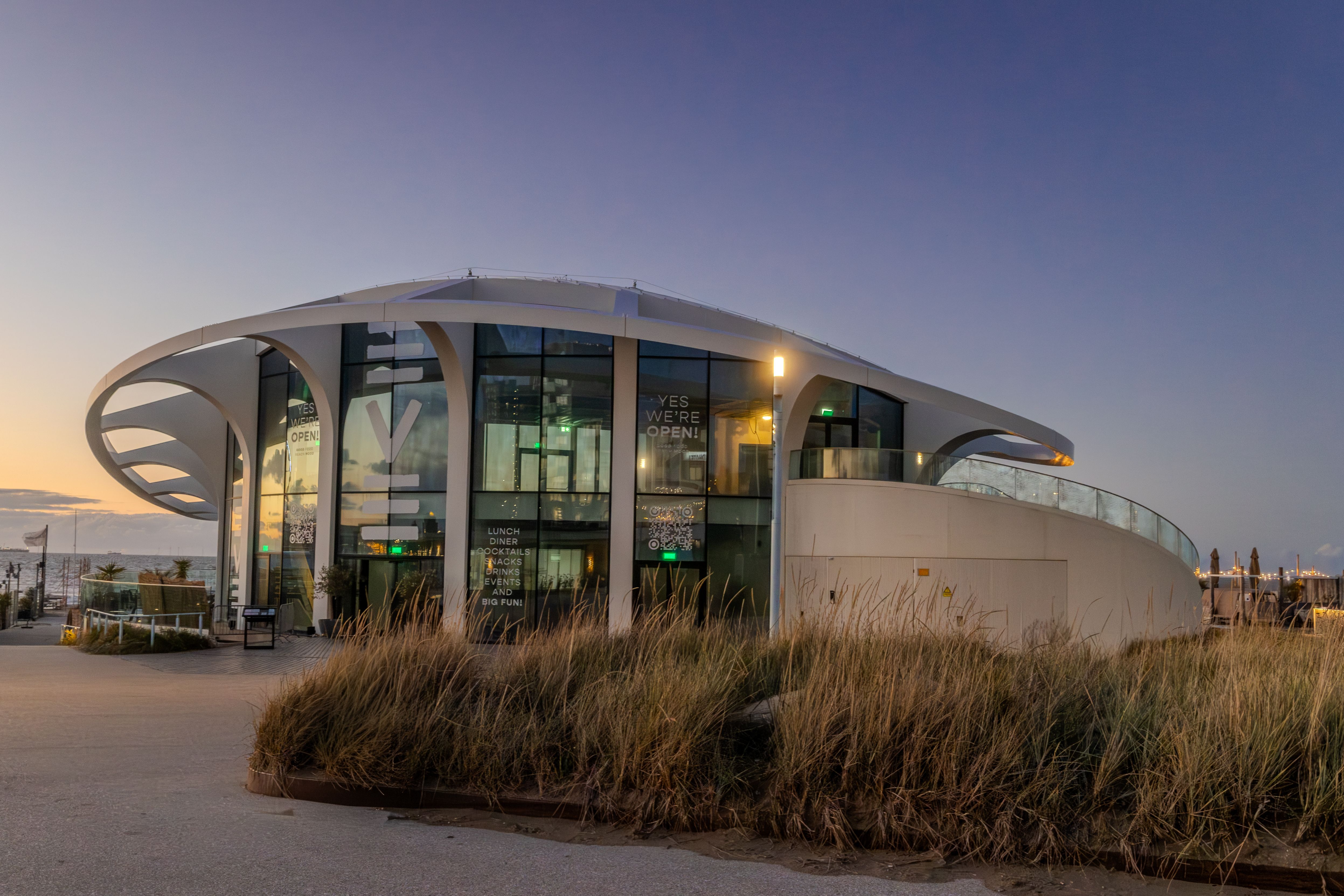 Modern Beachfront Building at Sunset in The Hague · Free Stock Photo