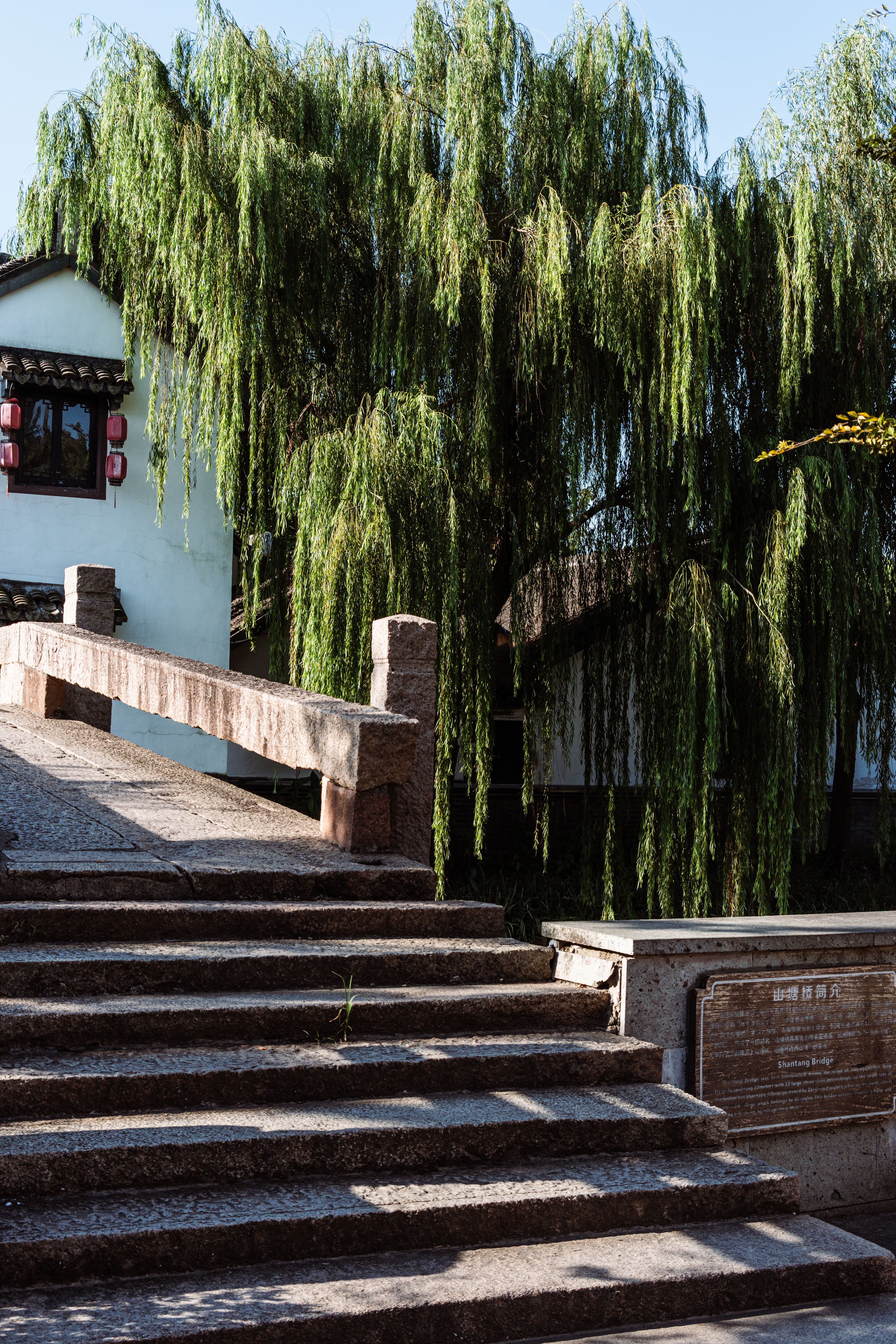 Tranquil Stone Bridge with Willow Tree · Free Stock Photo