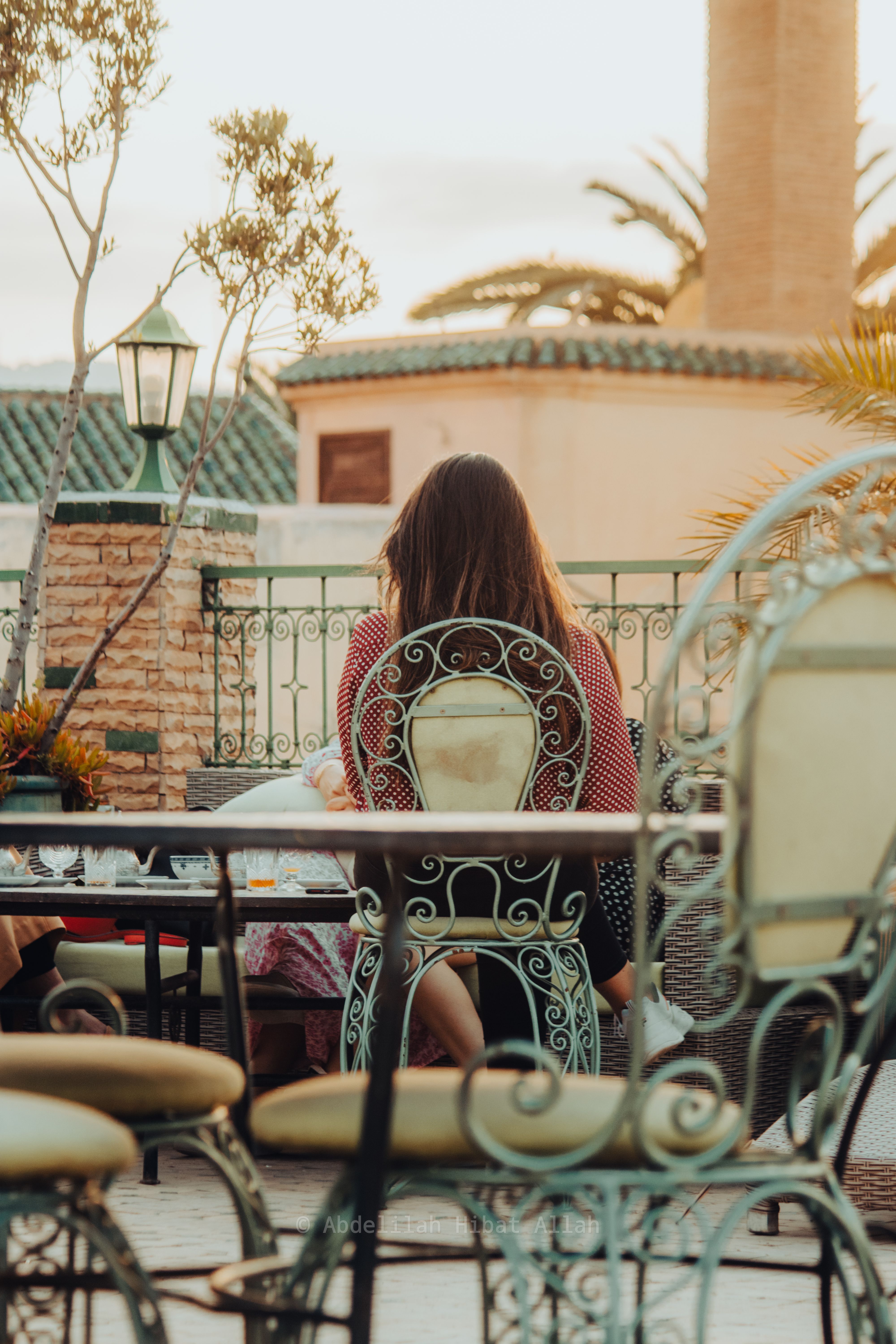 Charming Outdoor Cafe Scene in Moroccan Setting · Free Stock Photo