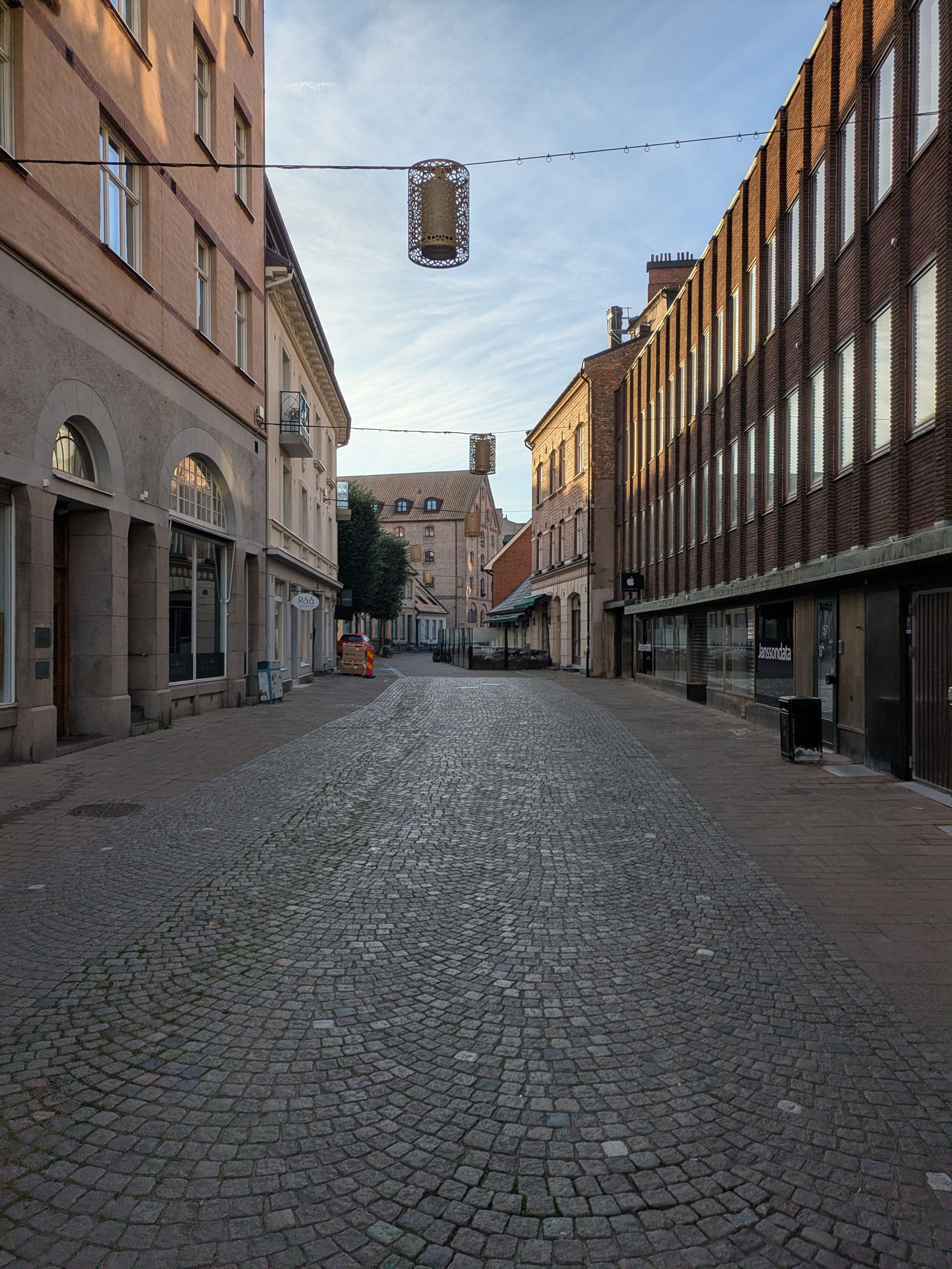 Empty European Street with Cobblestone Path · Free Stock Photo
