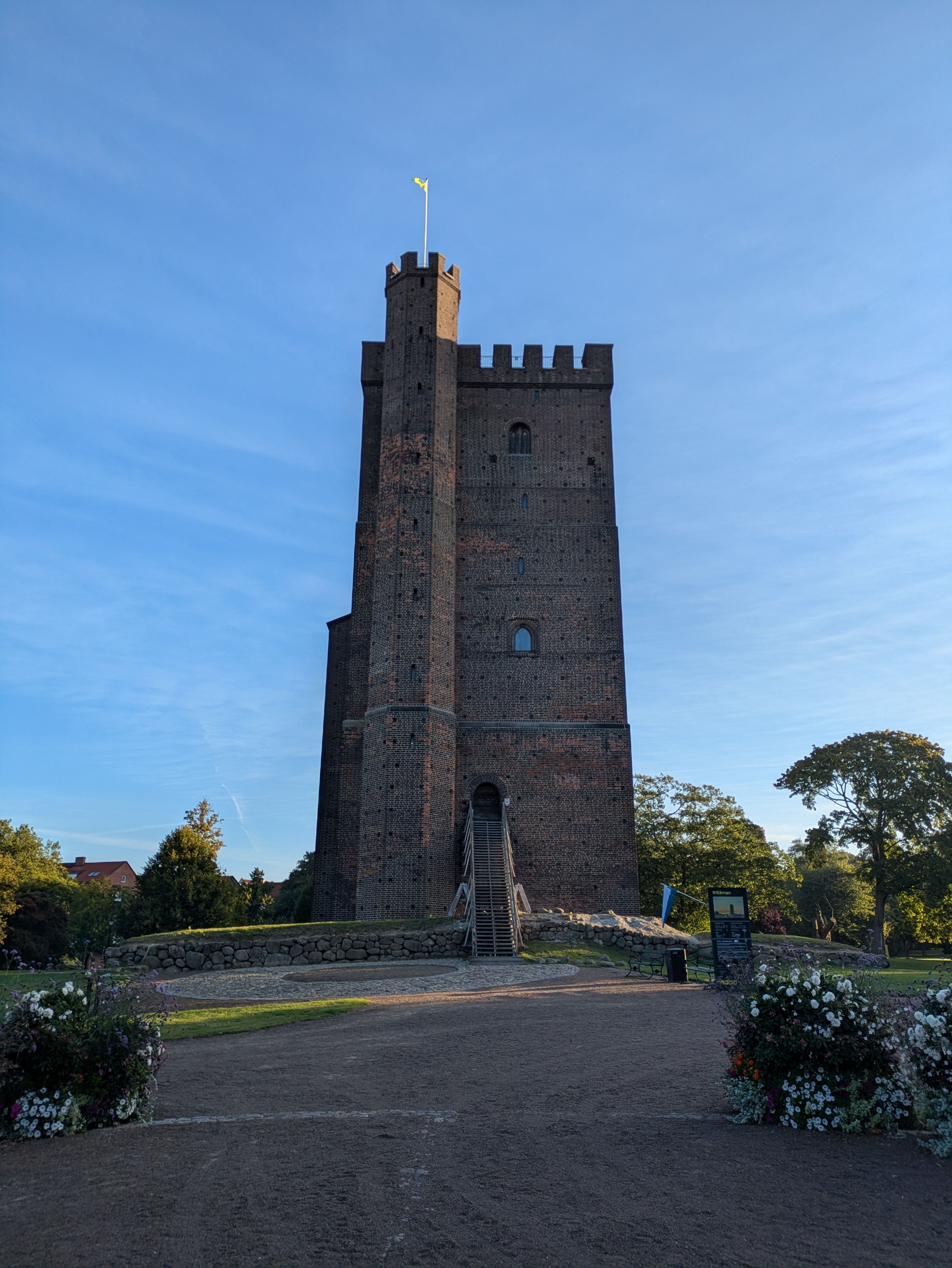 Medieval Brick Tower Against Clear Sky · Free Stock Photo