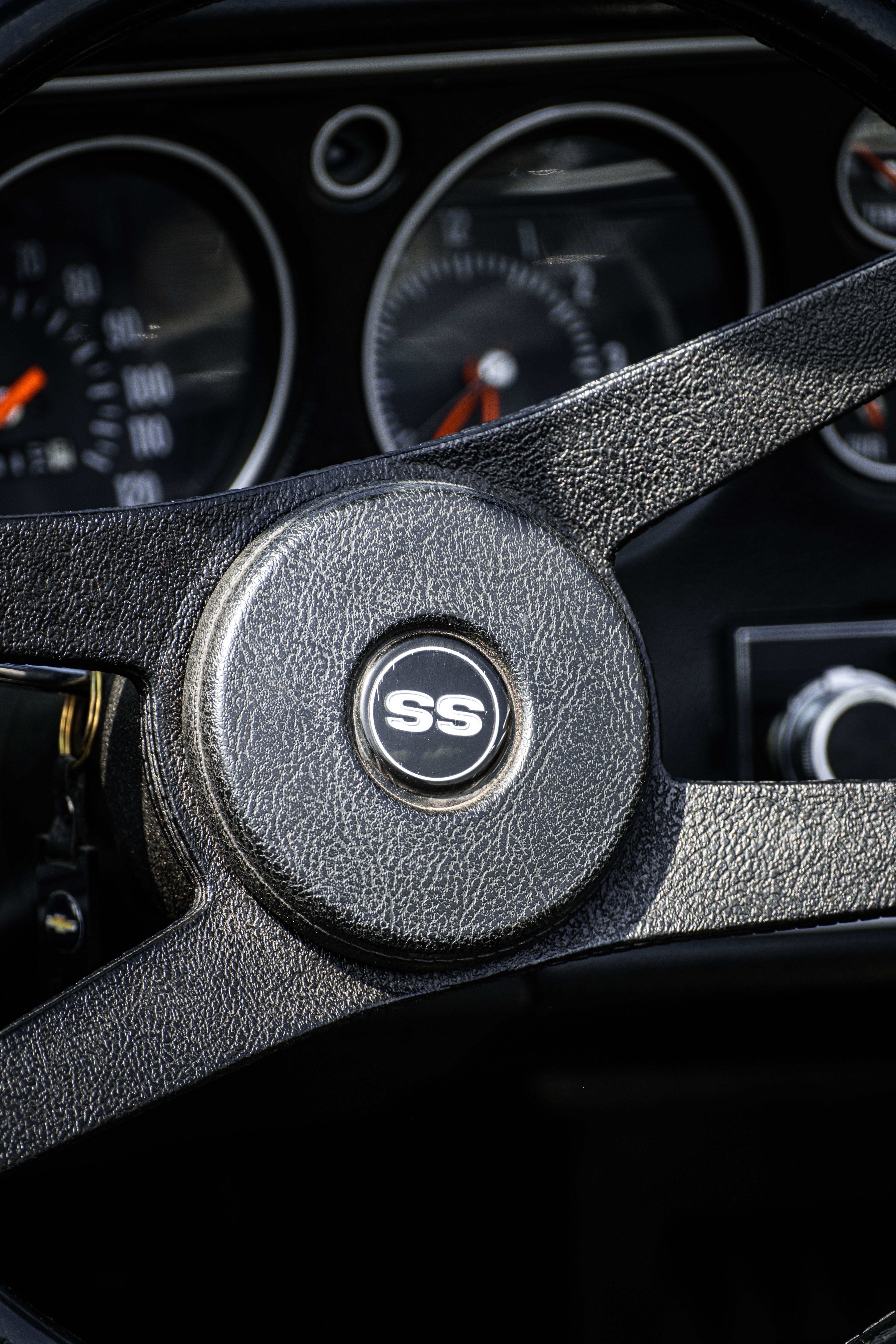 Classic Car Steering Wheel with SS Emblem · Free Stock Photo