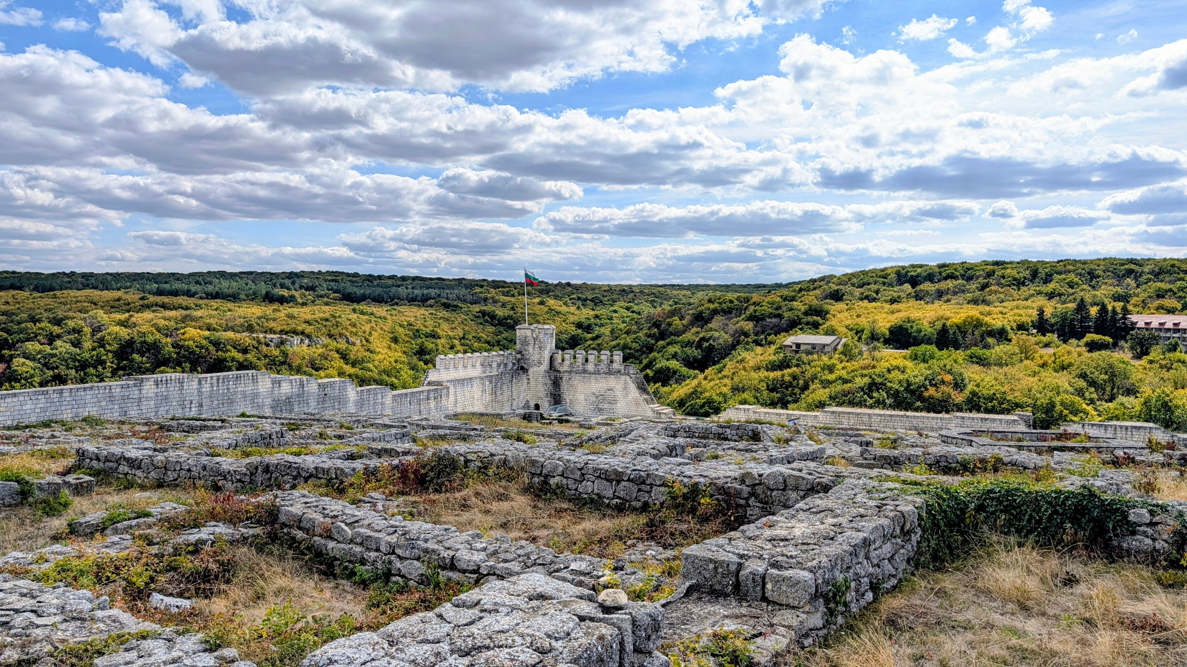 Ancient Stone Fort Overlooking Lush Forests · Free Stock Photo