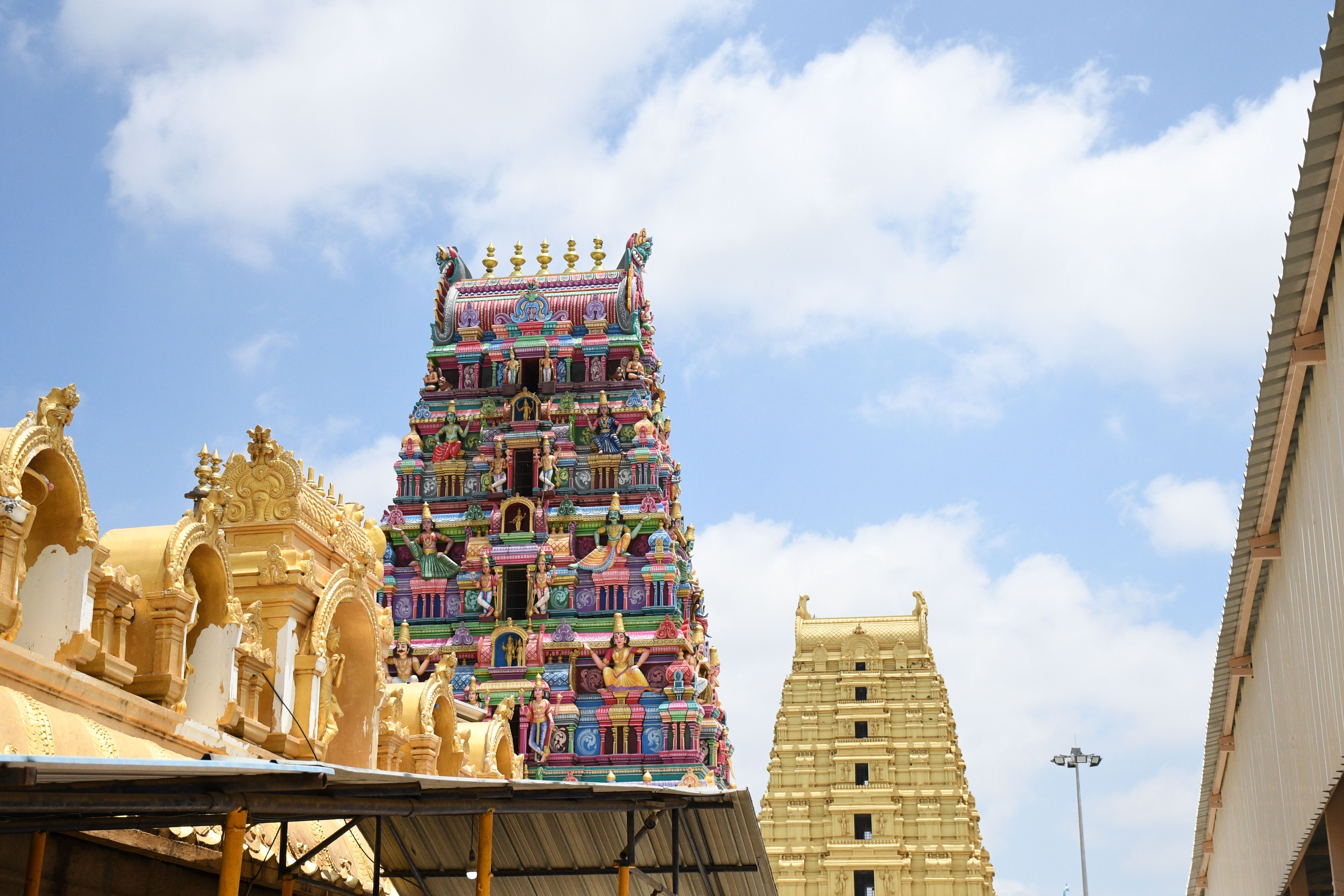 Colorful Hindu Temple Towers Against Blue Sky · Free Stock Photo