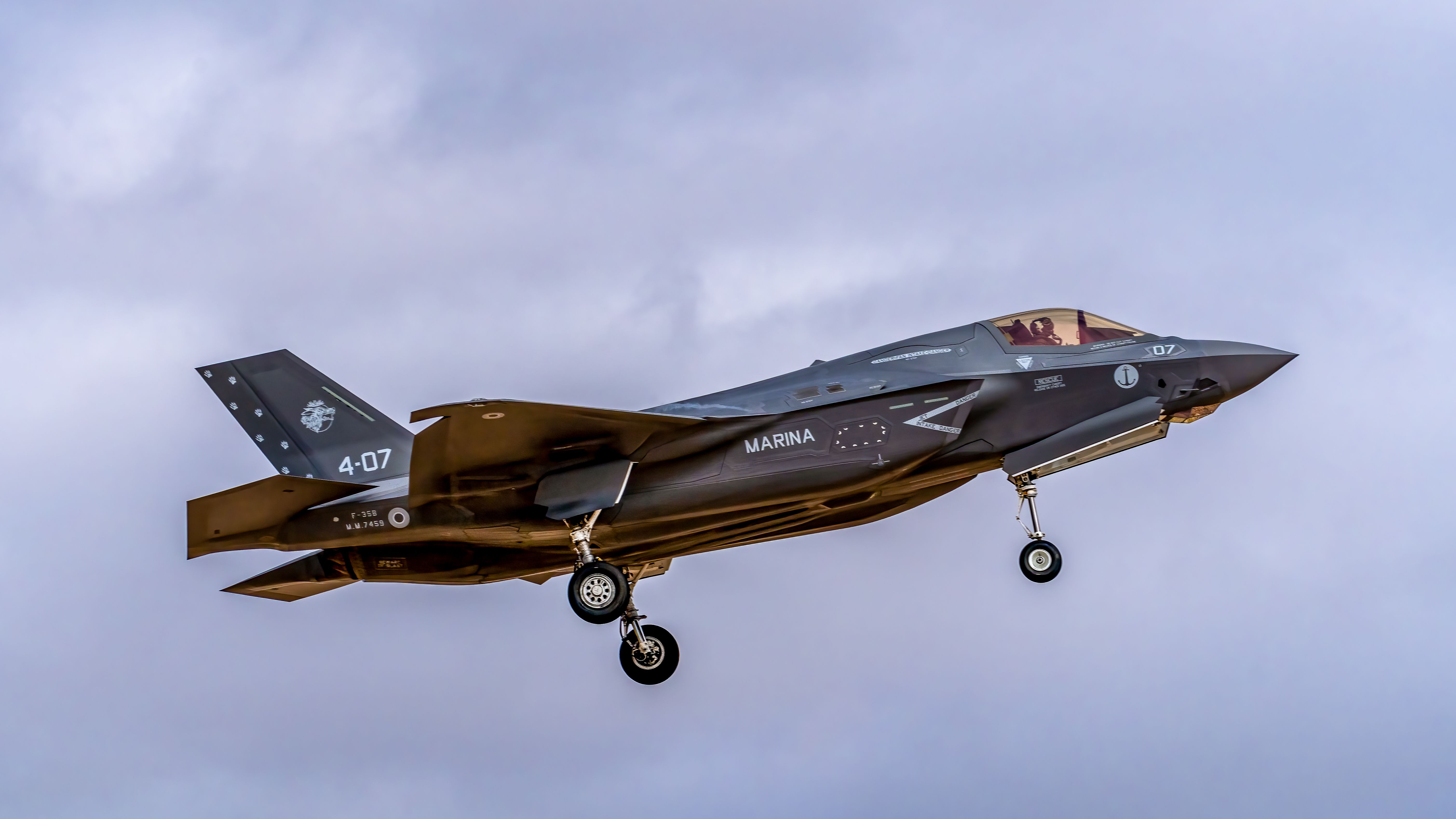 Lockheed F-35 Jet Flying in Cloudy Sky · Free Stock Photo