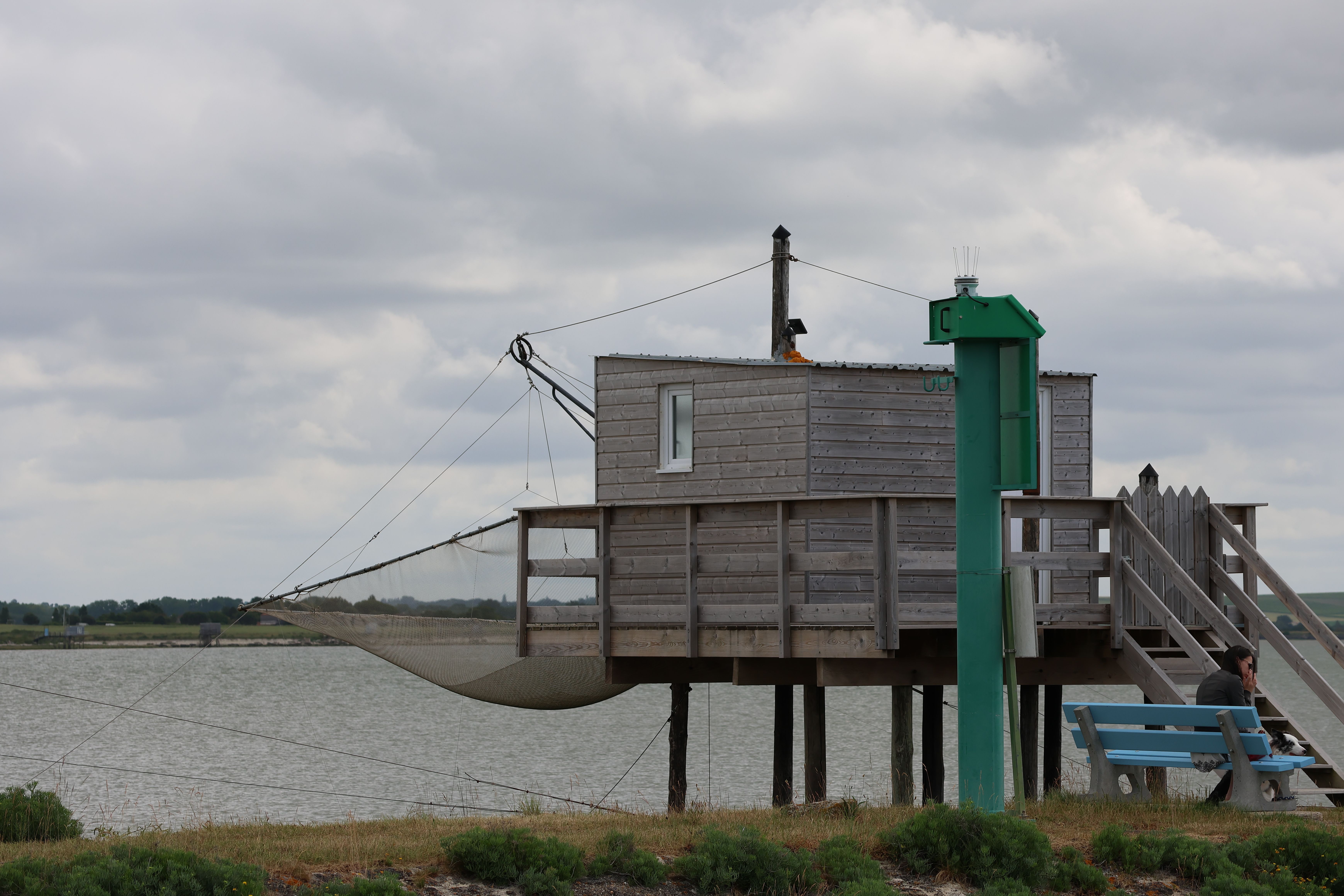 Rustic Fishing Hut by Tranquil Waterside · Free Stock Photo