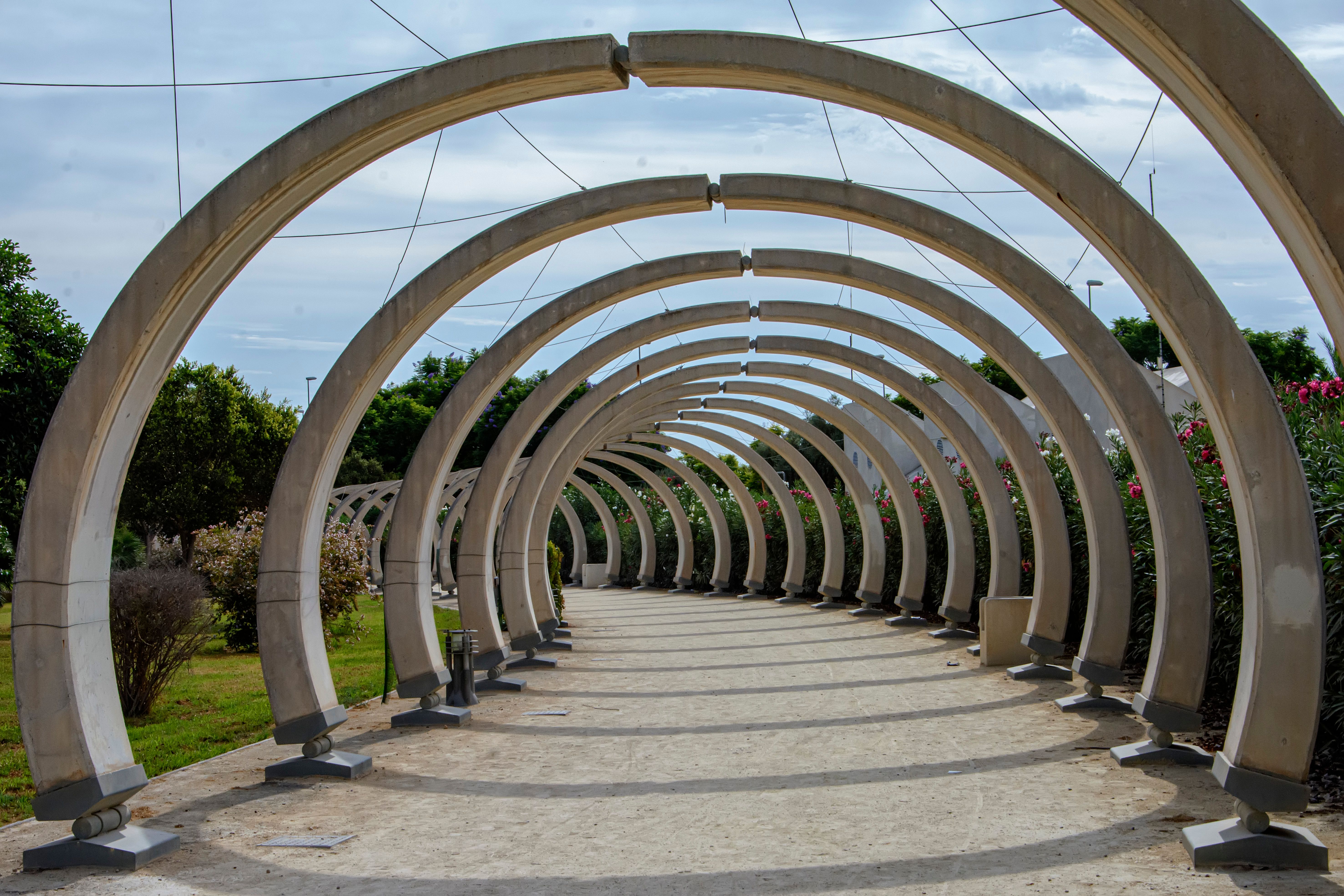 Modern Architectural Arches in Spanish Park · Free Stock Photo