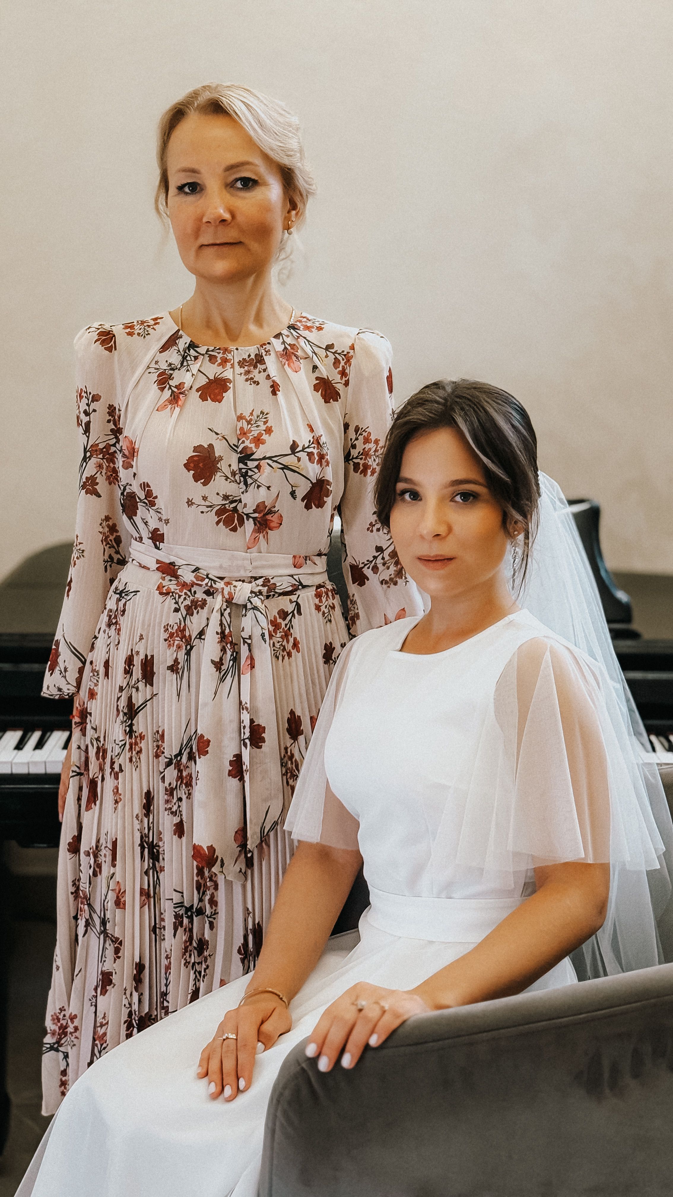 Elegant Portrait of Bride with Mother in Floral Attire · Free Stock Photo