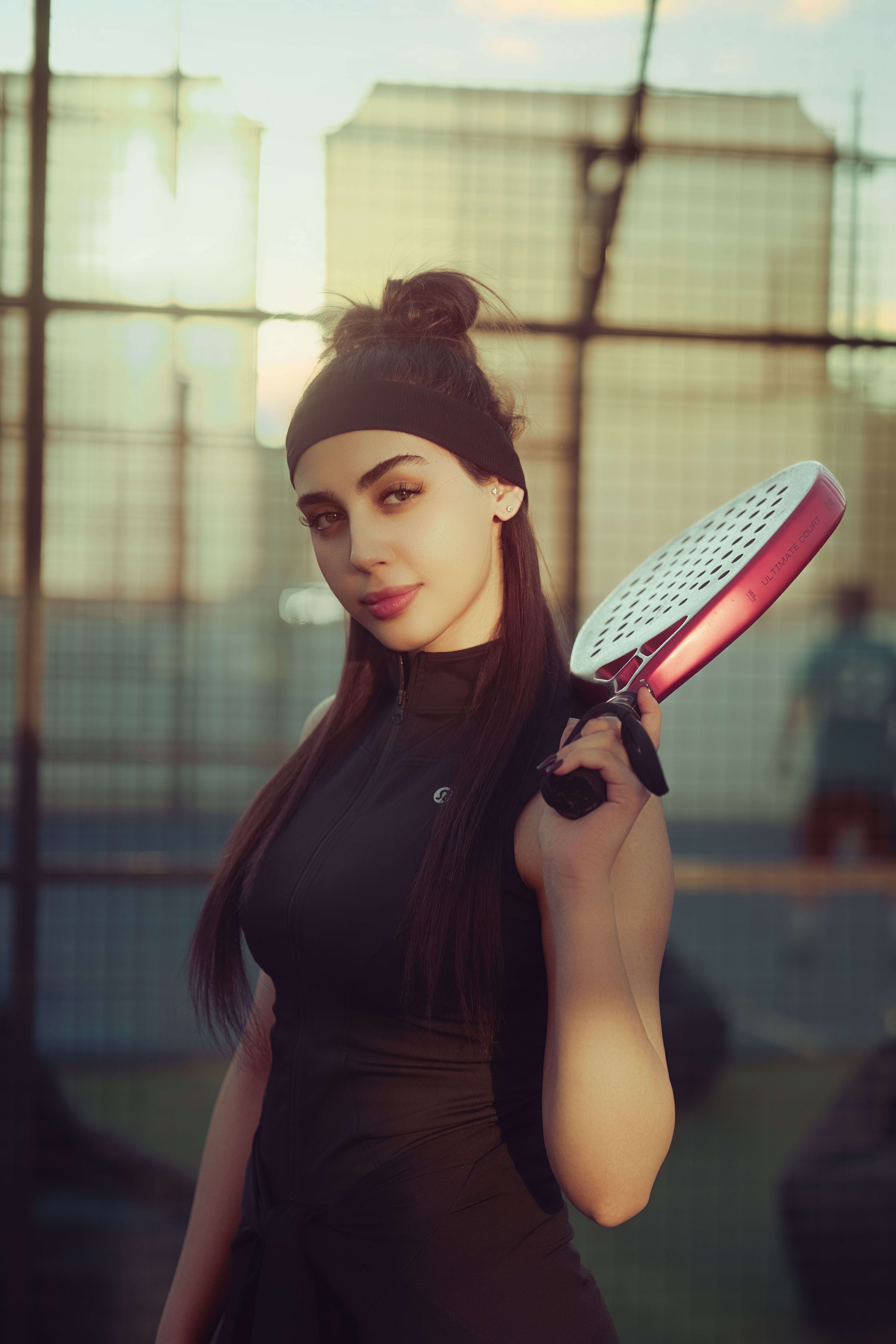 Woman Posing with Padel Racket on Court · Free Stock Photo