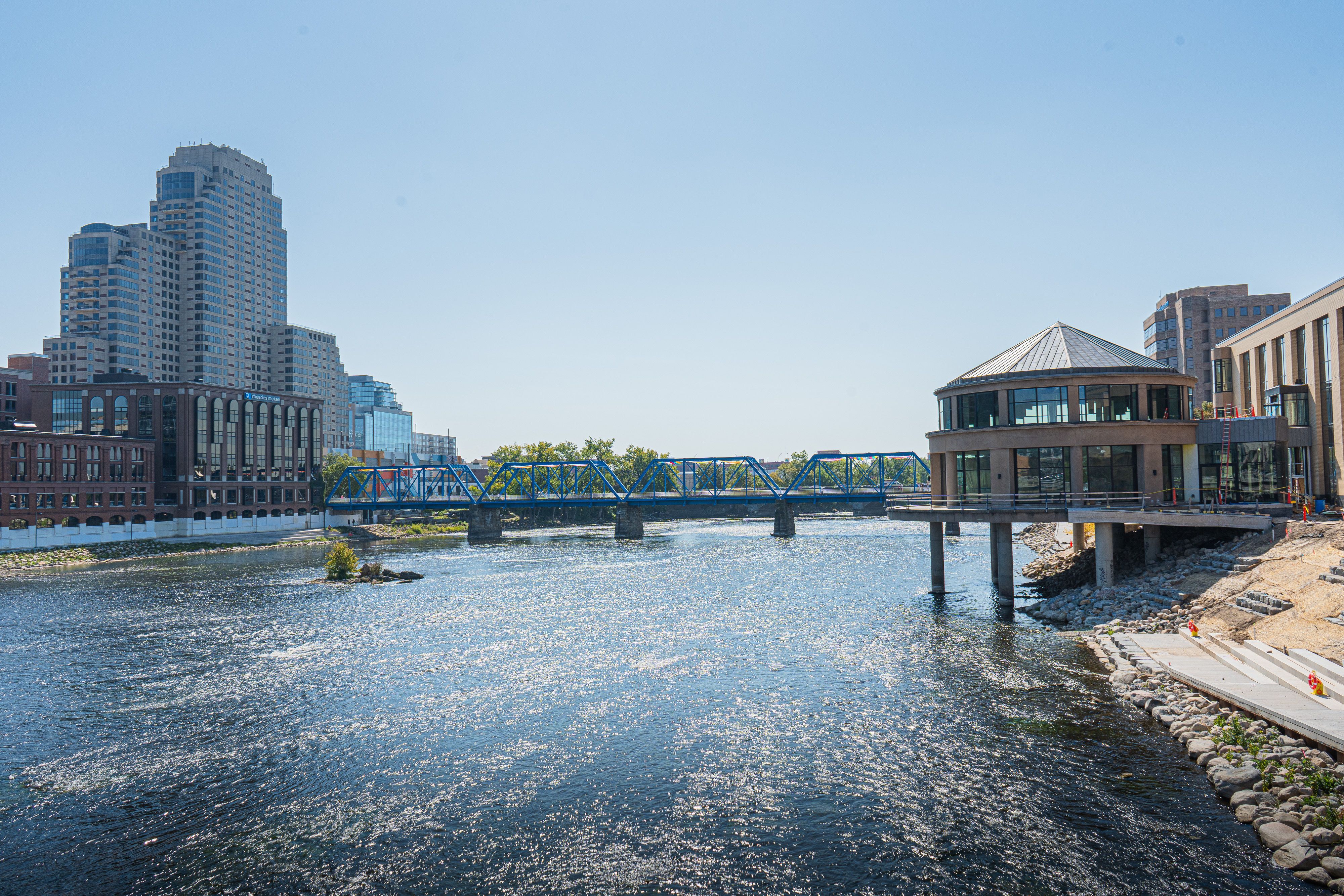 Iconic Blue Bridge Over Grand Rapids River · Free Stock Photo