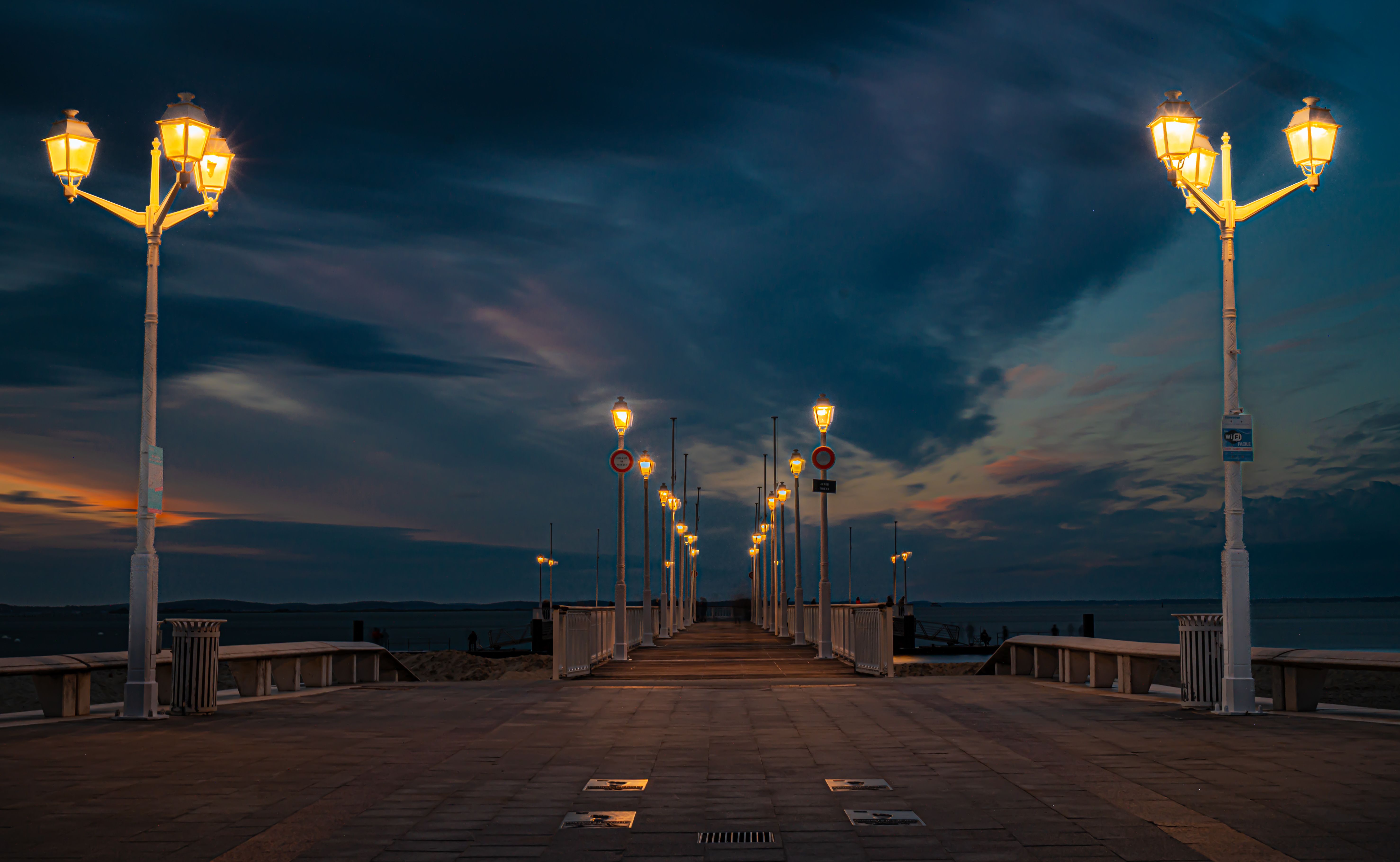 Illuminated Seaside Promenade at Dusk in Bretagna, France · Free Stock ...