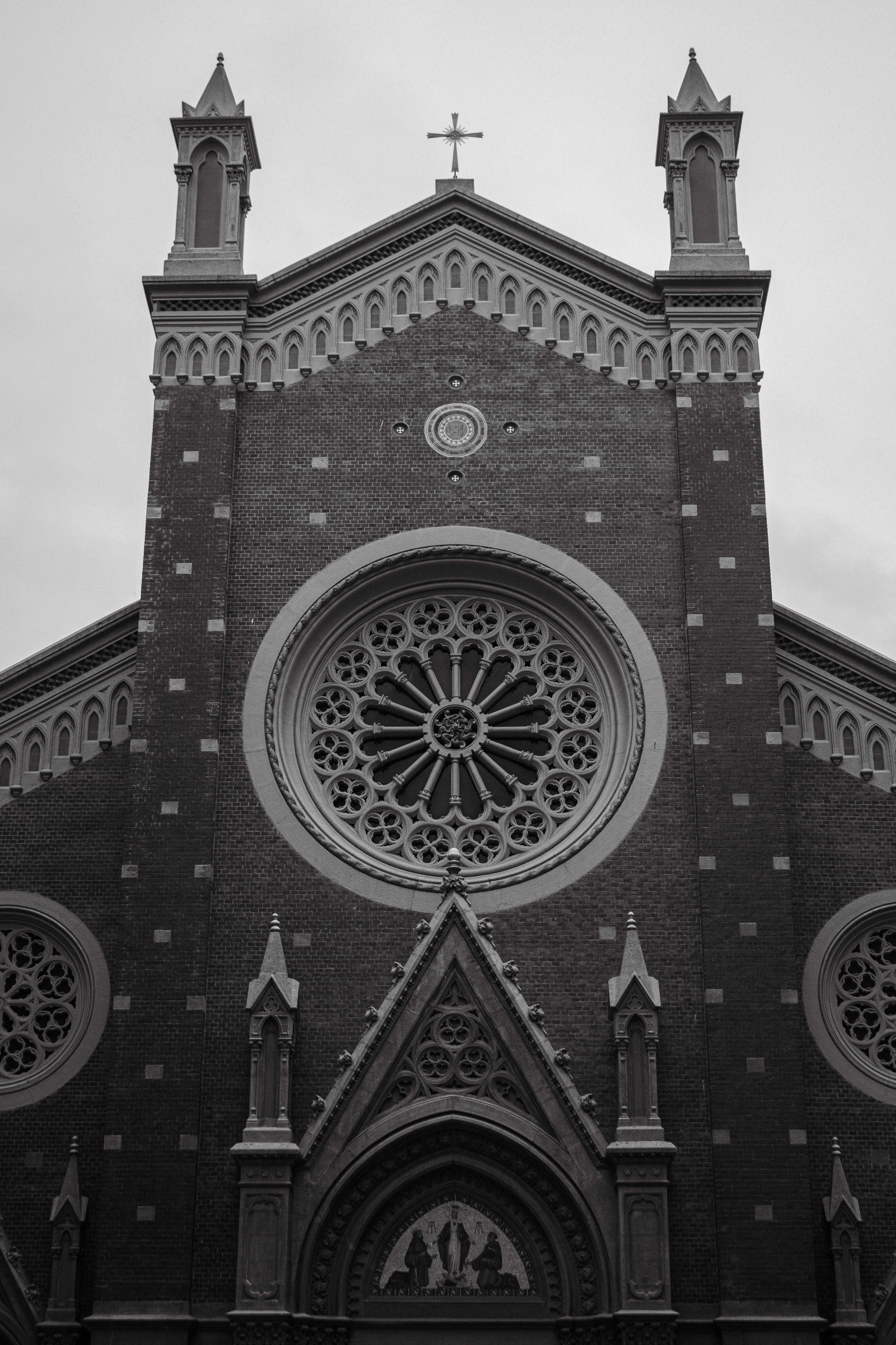 Gothic Church Facade with Circular Stained Glass · Free Stock Photo