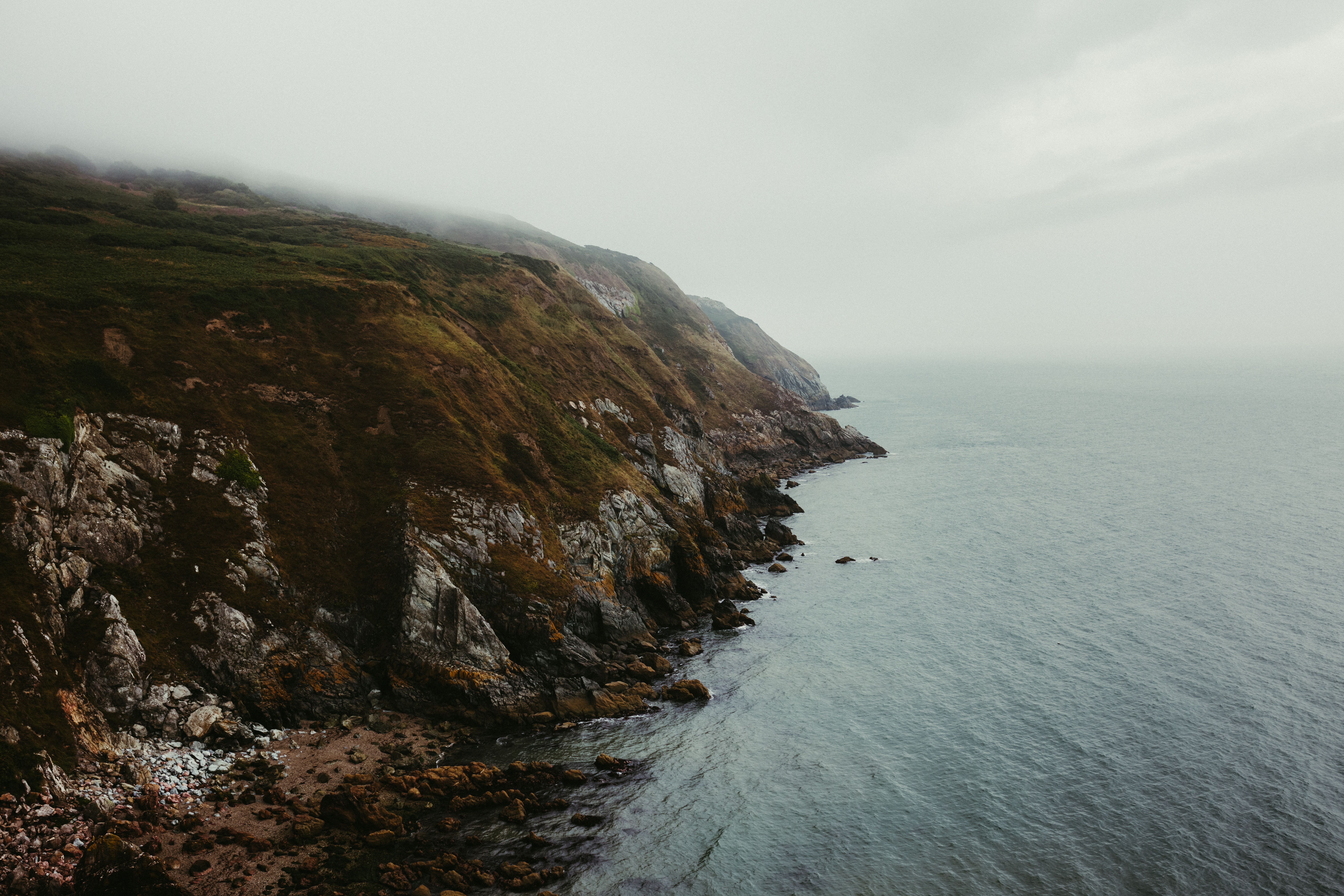 Misty Coastal Cliffs of Howth, Ireland · Free Stock Photo