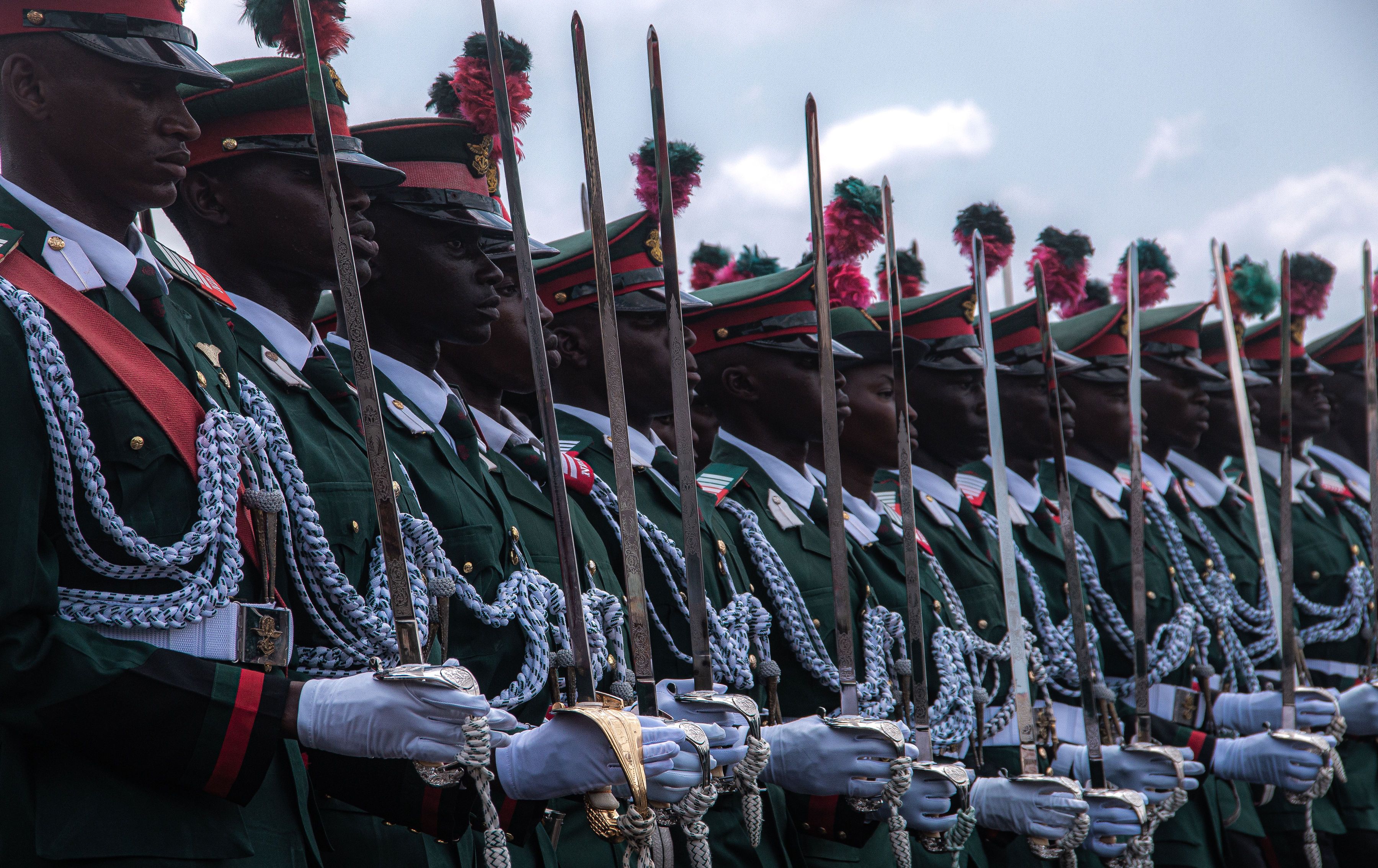 Ceremonial Military Parade with Sword Bearers · Free Stock Photo