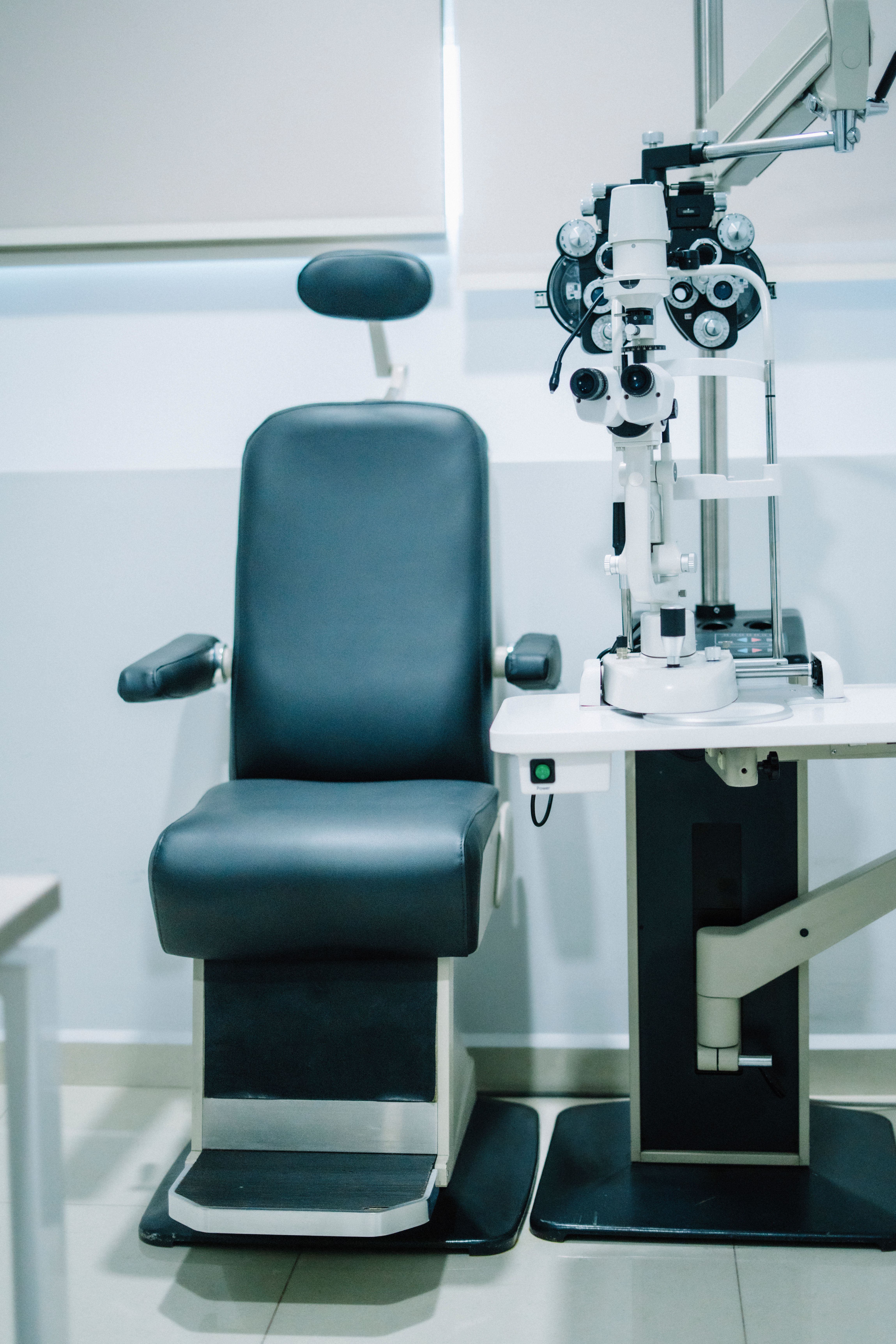 Eye Examination Room with Medical Equipment · Free Stock Photo