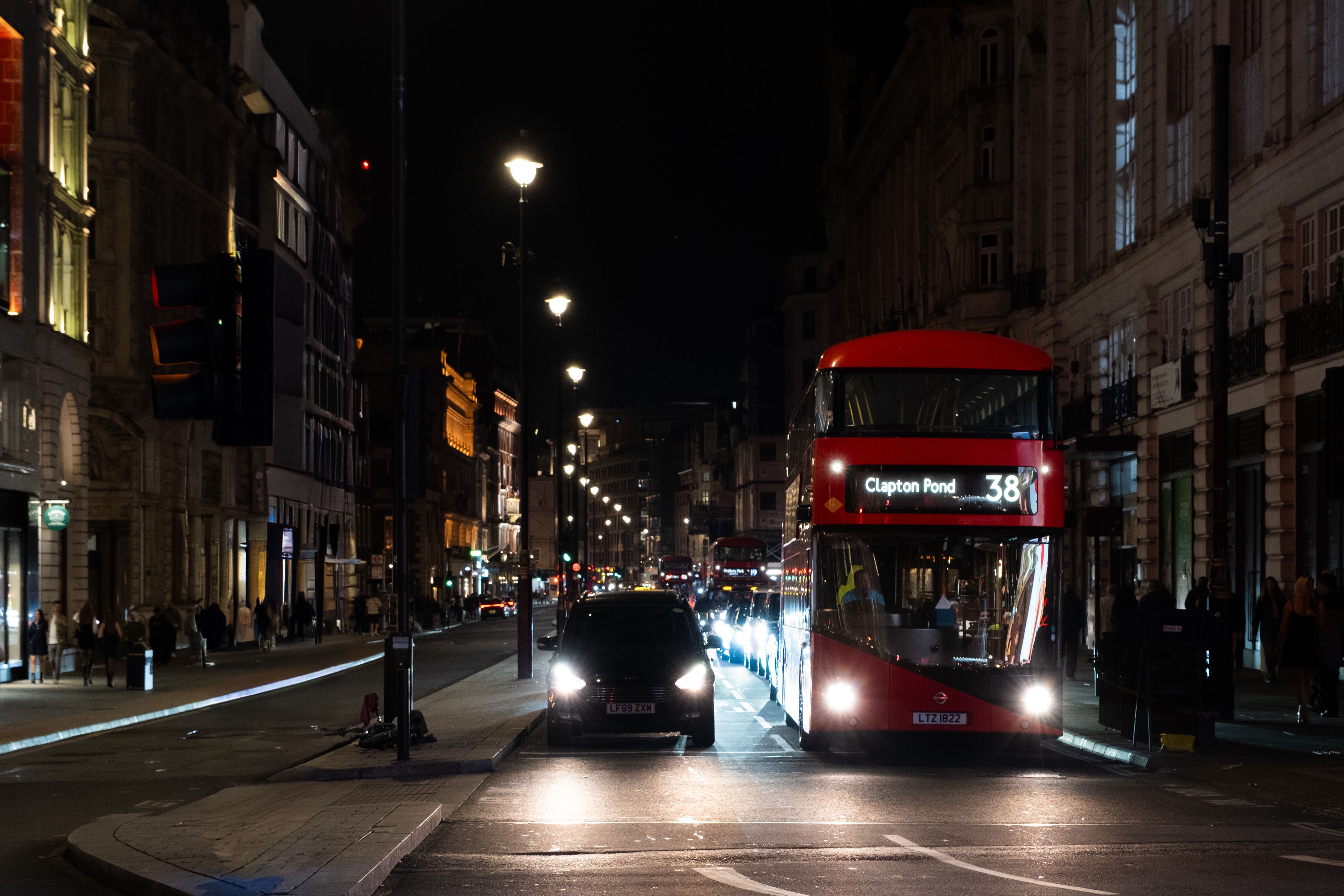 Night Scene of London Street with Double-Decker Bus · Free Stock Photo
