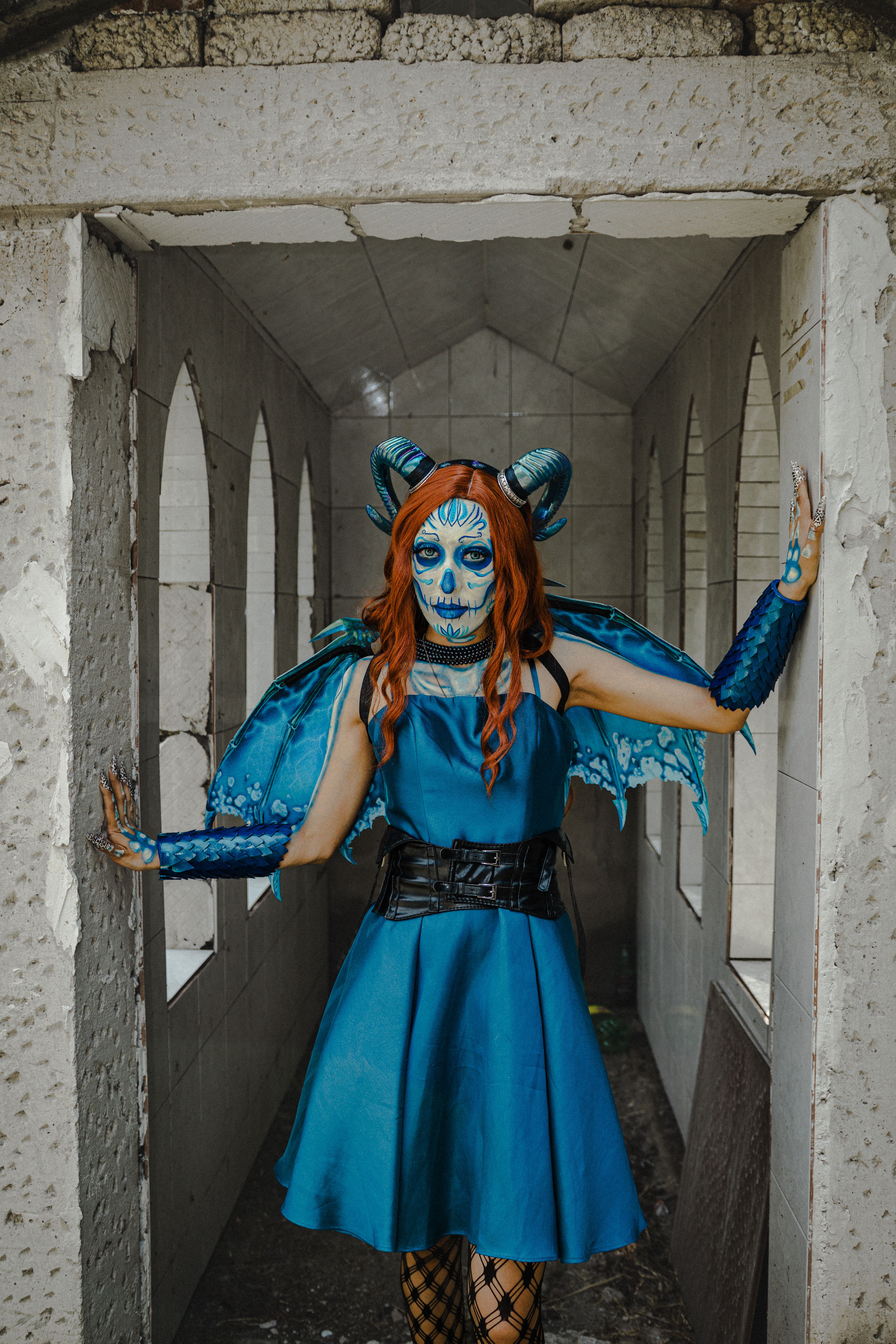 Enchanting Blue-Horned Fantasy Character Portrait · Free Stock Photo