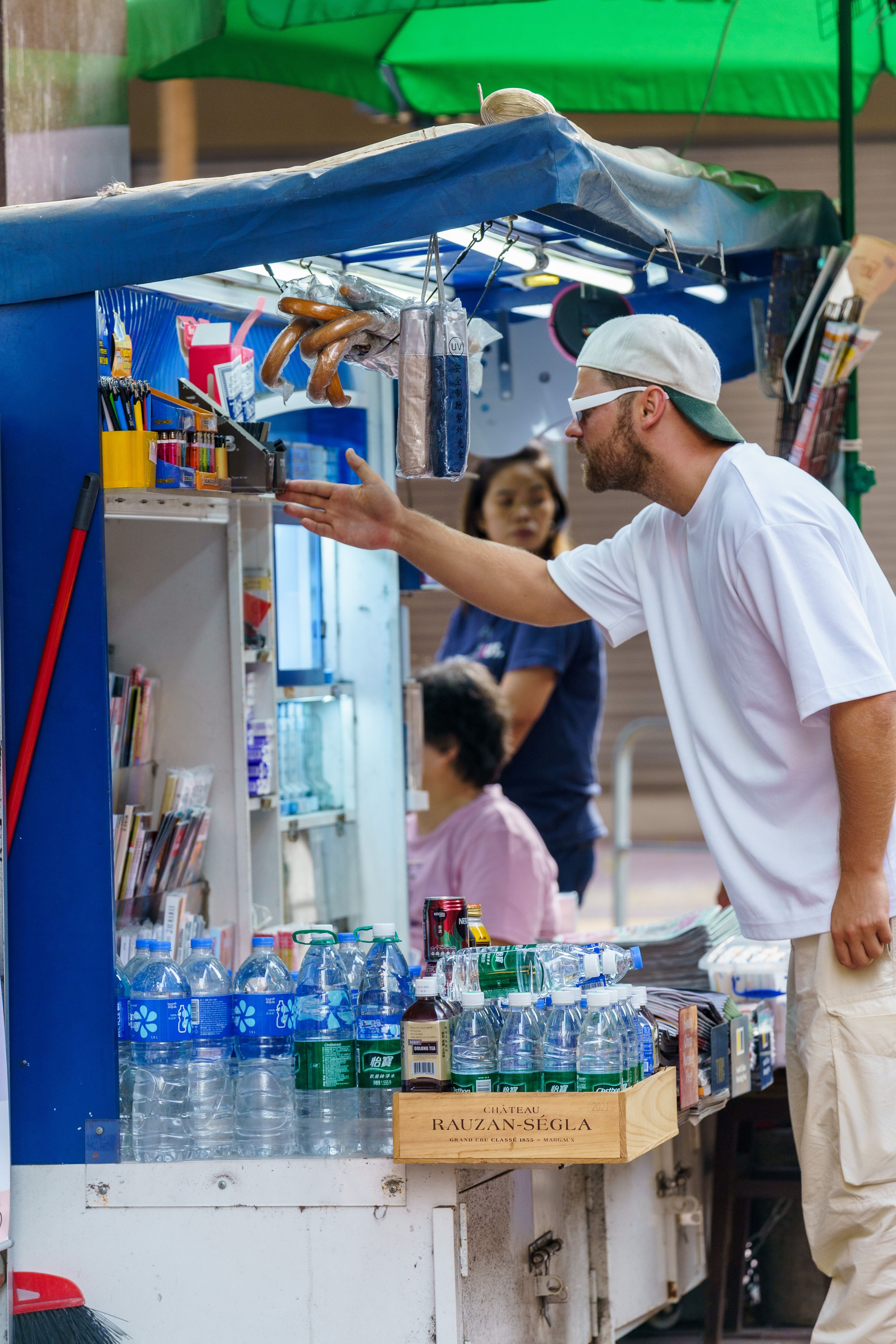 Man Buying Snacks at Outdoor Street Vendor · Free Stock Photo