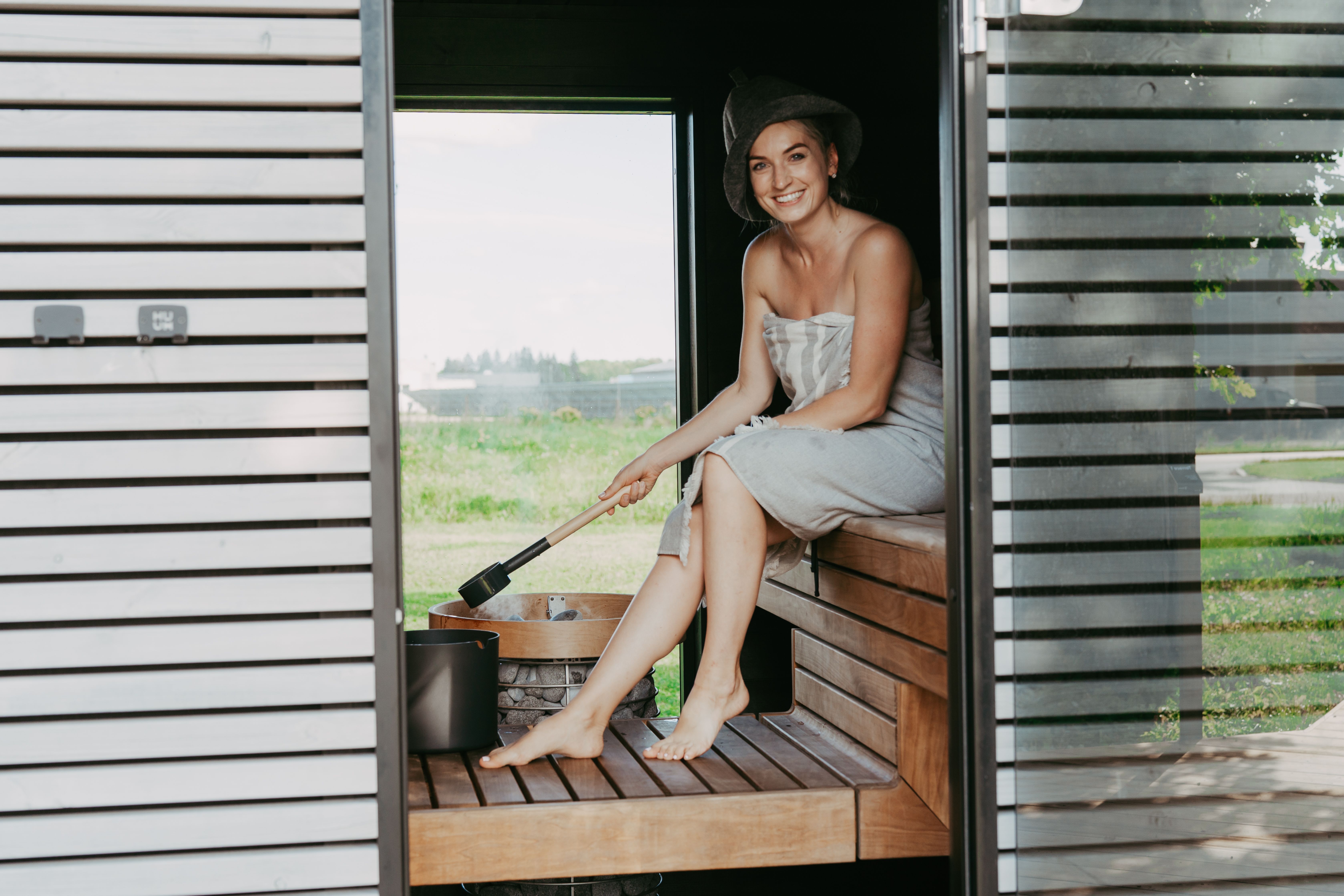 Relaxing in a Modern Sauna with Nordic Design · Free Stock Photo
