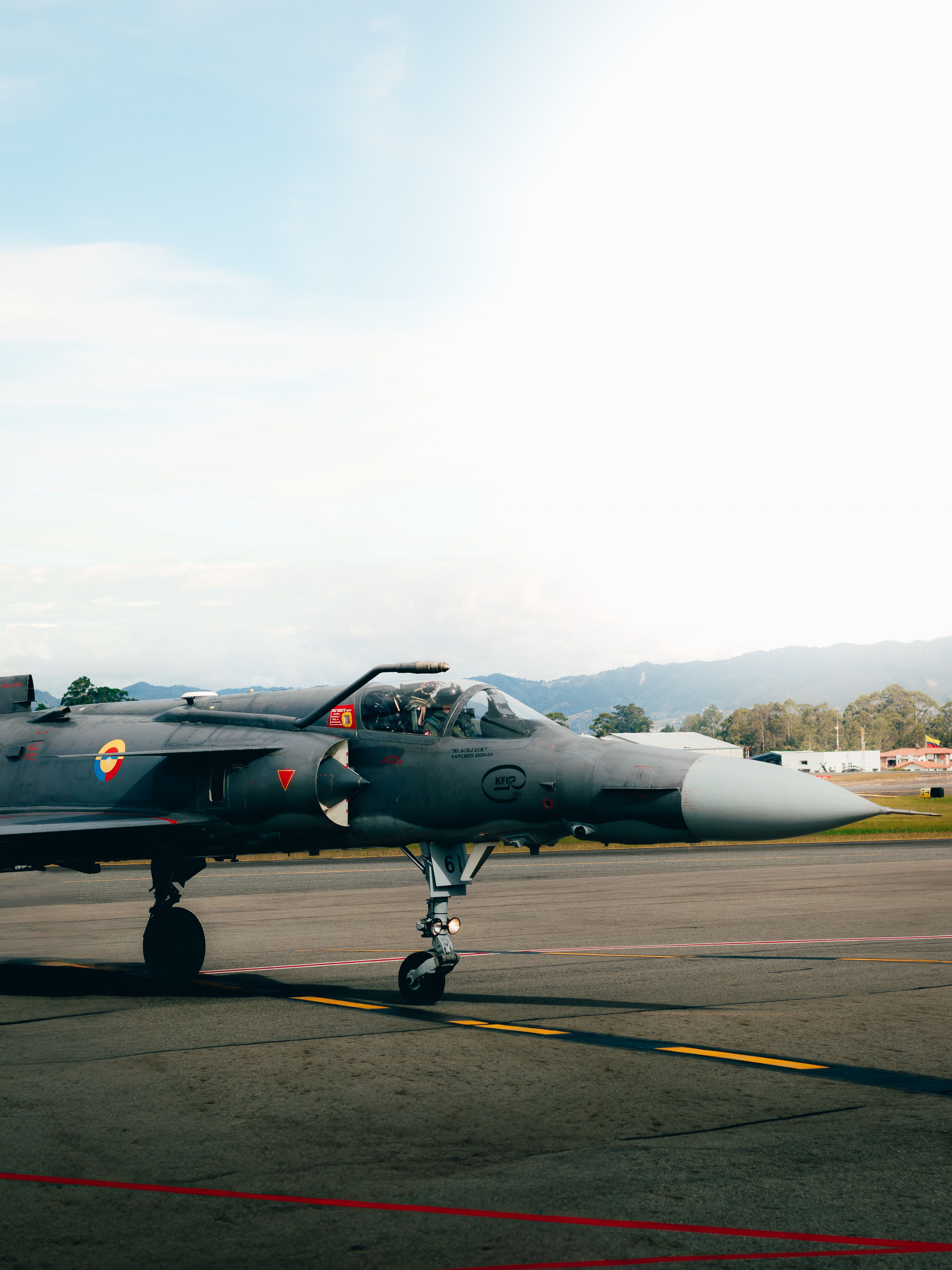 Military Jet Aircraft on Runway in Colombia · Free Stock Photo