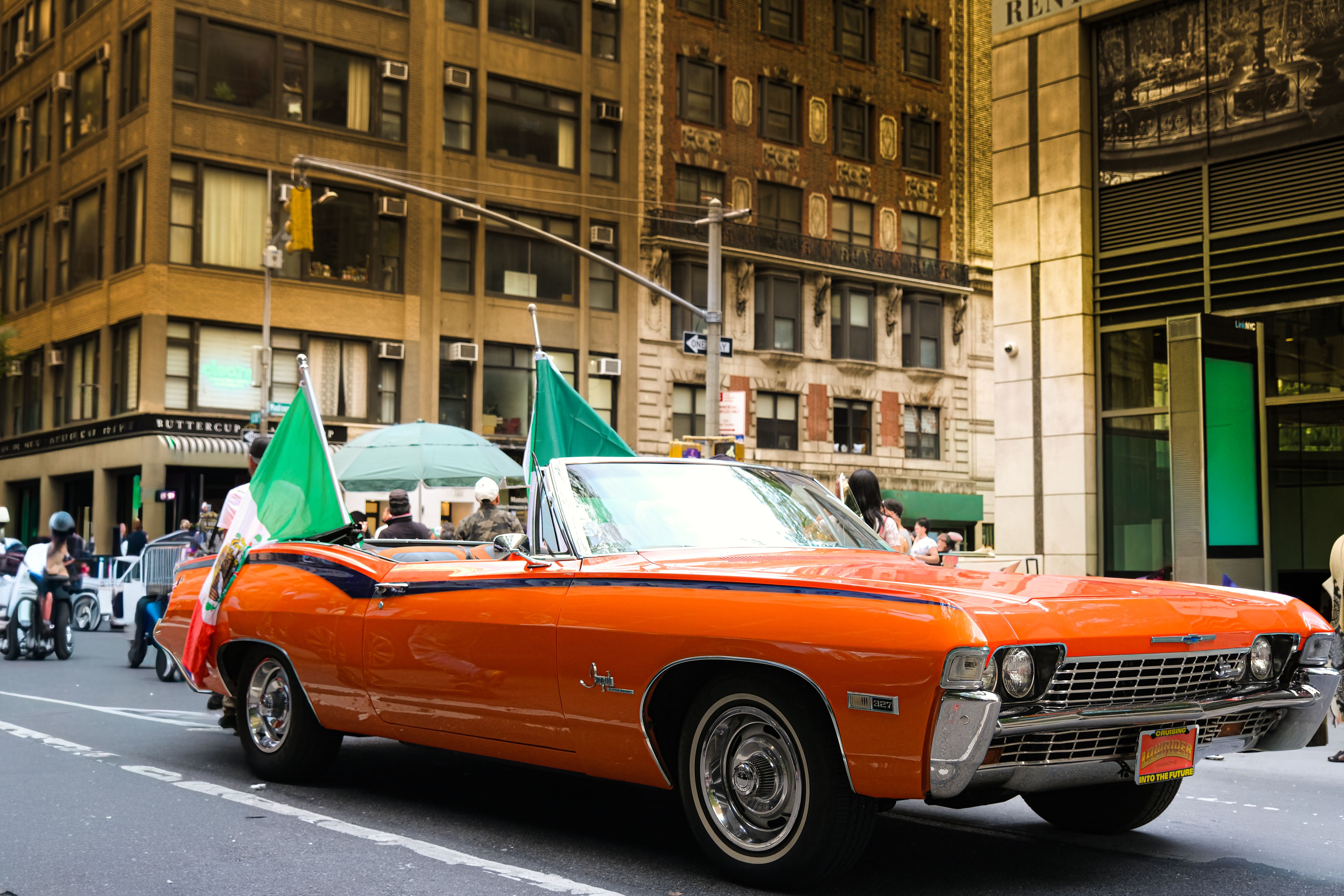 Classic Orange Convertible at NYC Parade · Free Stock Photo
