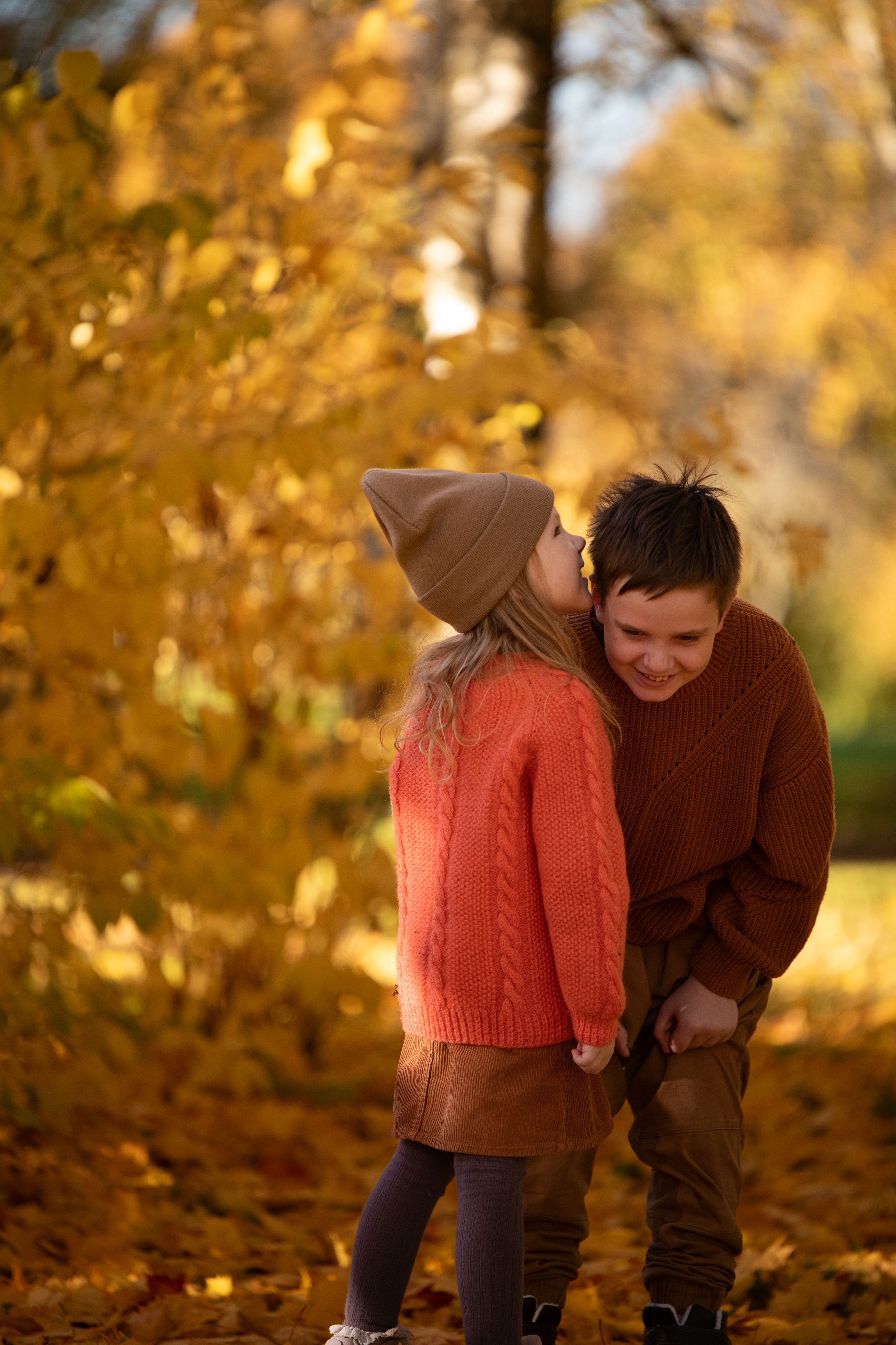 Children Playing in Autumn Leaves Outdoors · Free Stock Photo