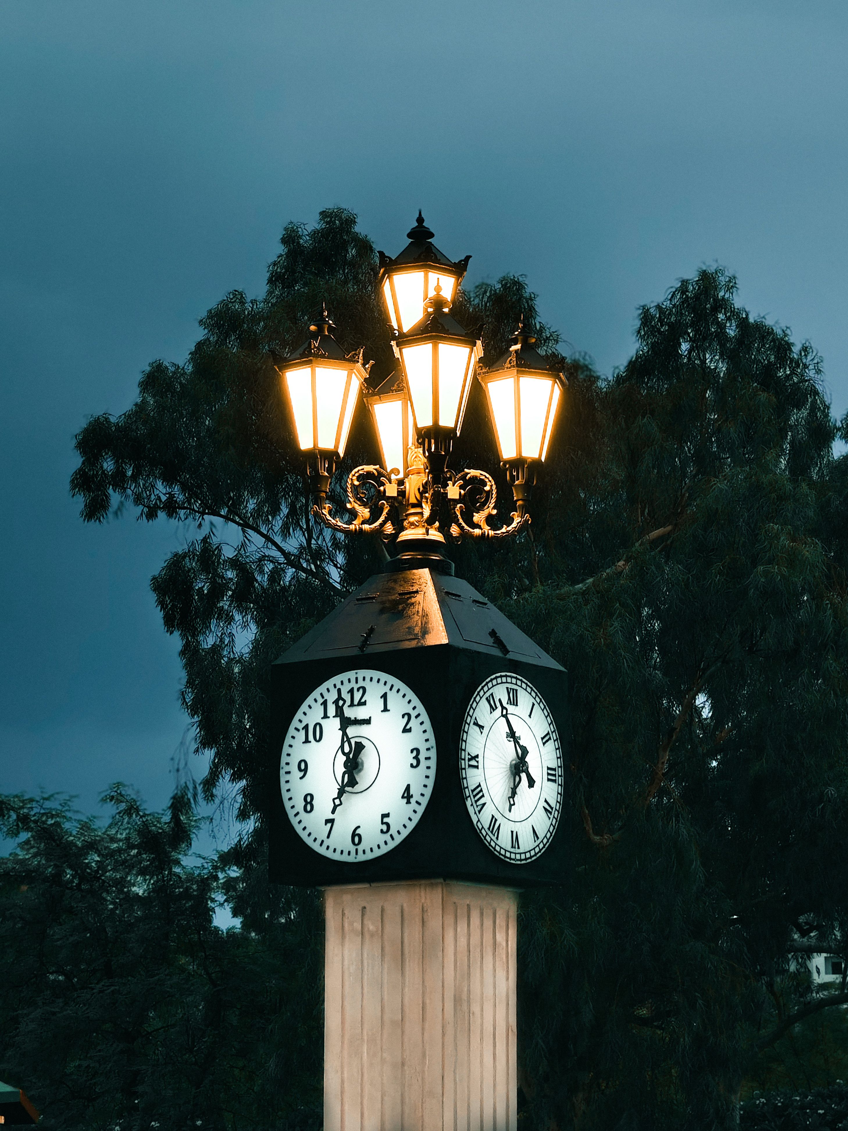 Vintage Street Clock Illuminated at Twilight · Free Stock Photo
