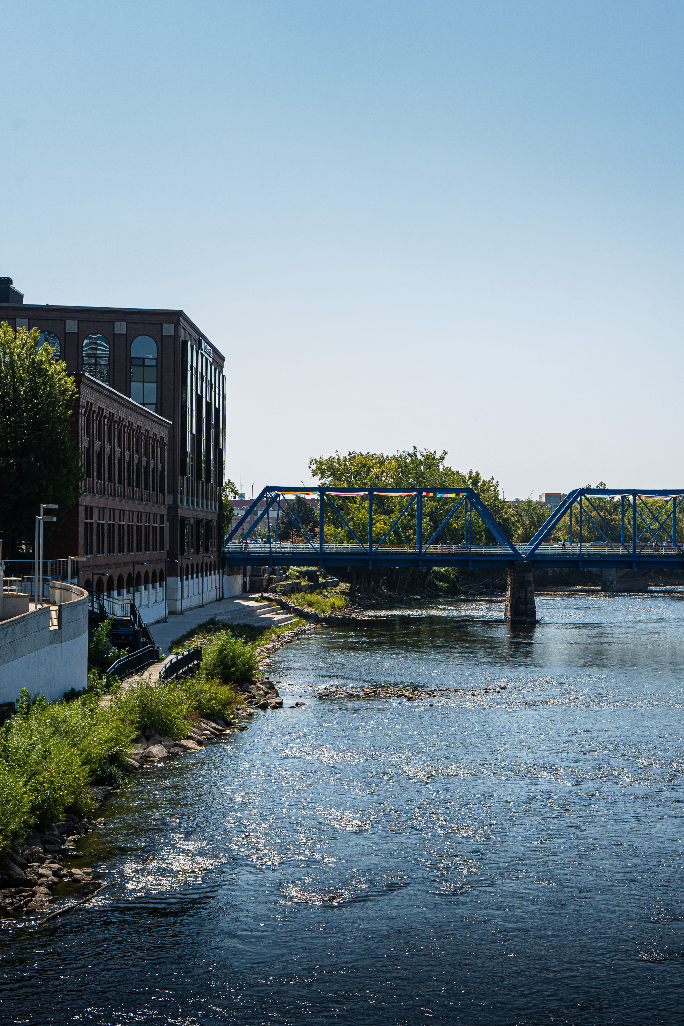 Iconic Blue Bridge Over Grand Rapids River · Free Stock Photo