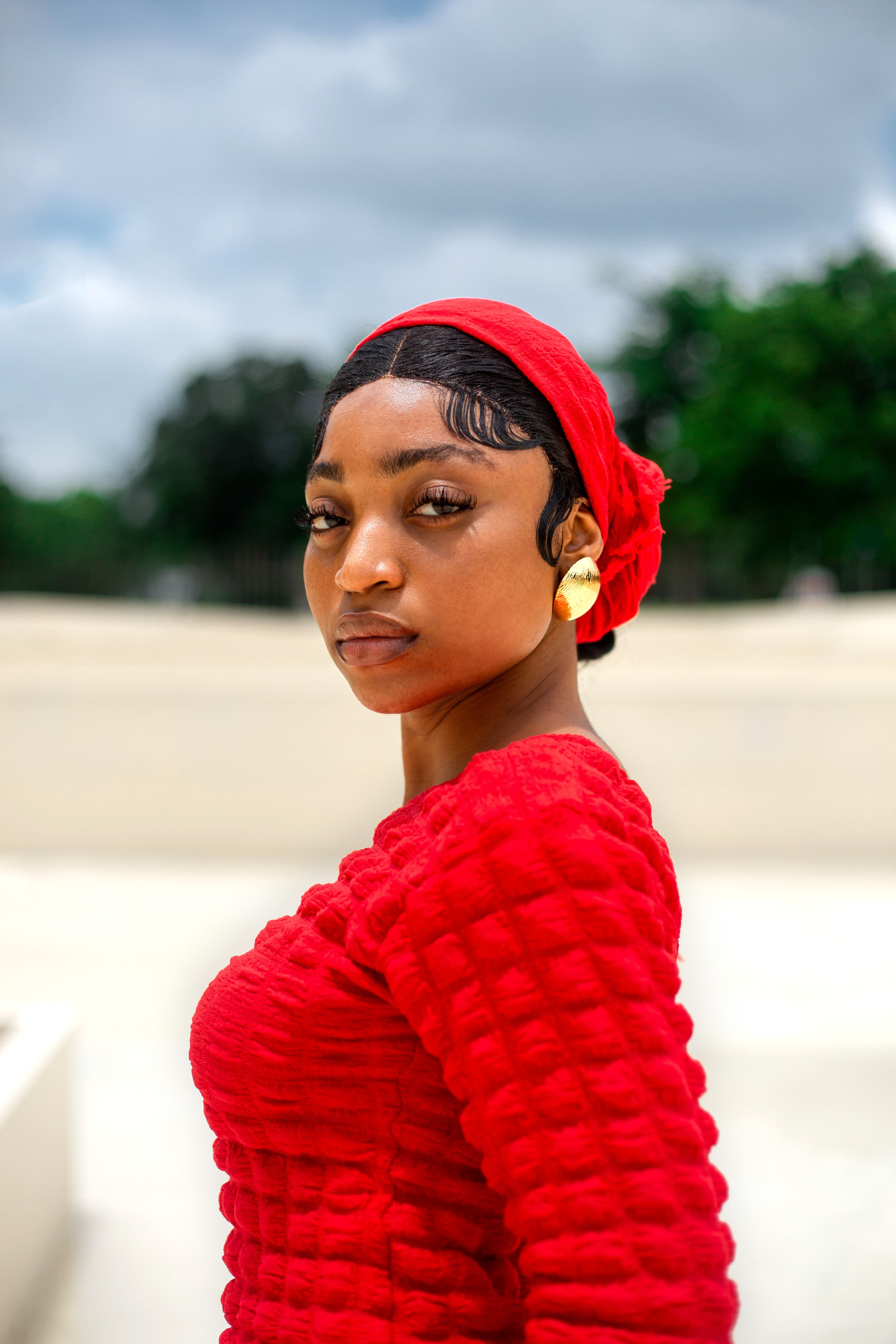 Elegant Portrait of a Woman in Red in Abuja · Free Stock Photo