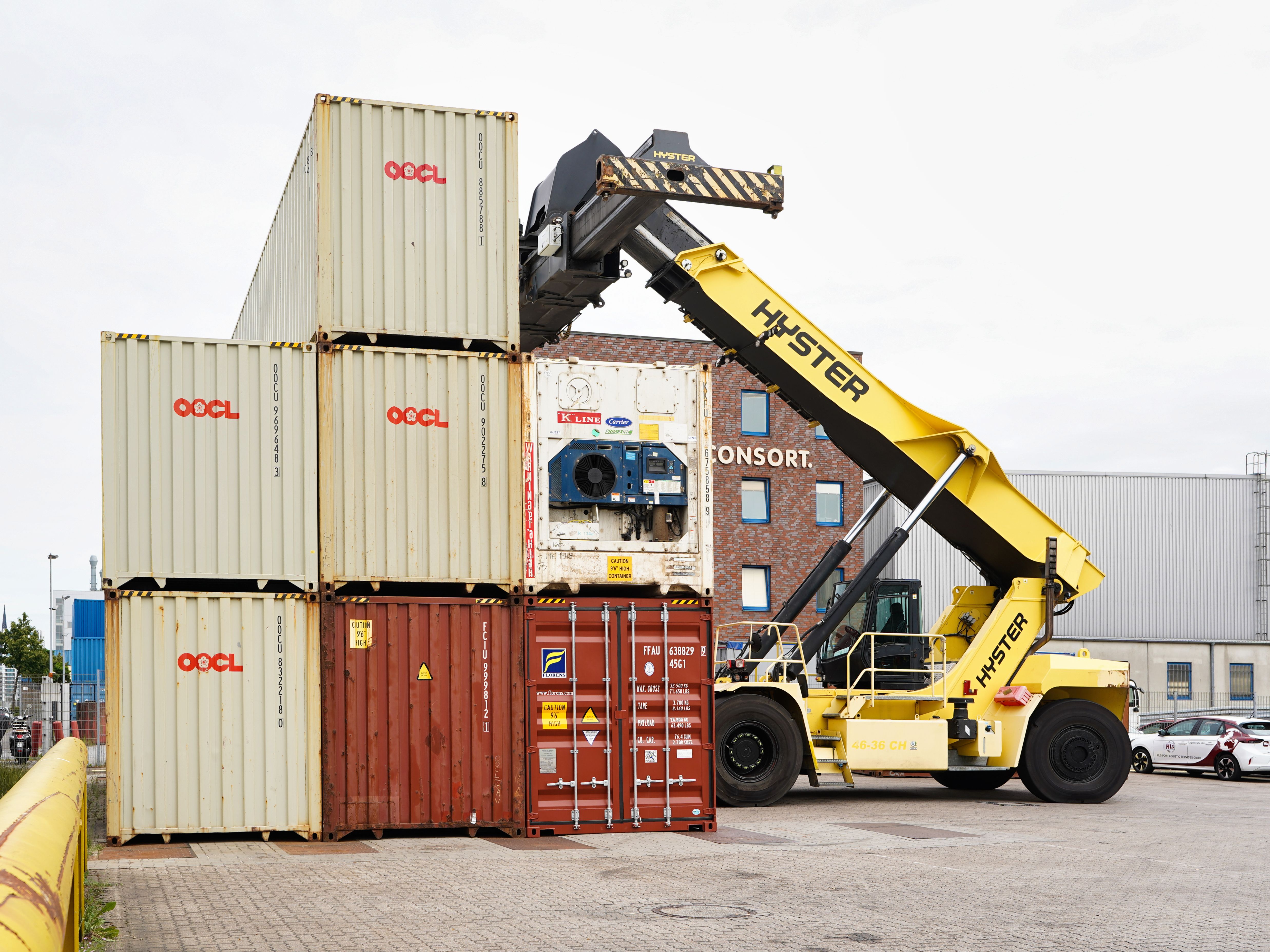 Container Stacker Operating in Hamburg Port · Free Stock Photo