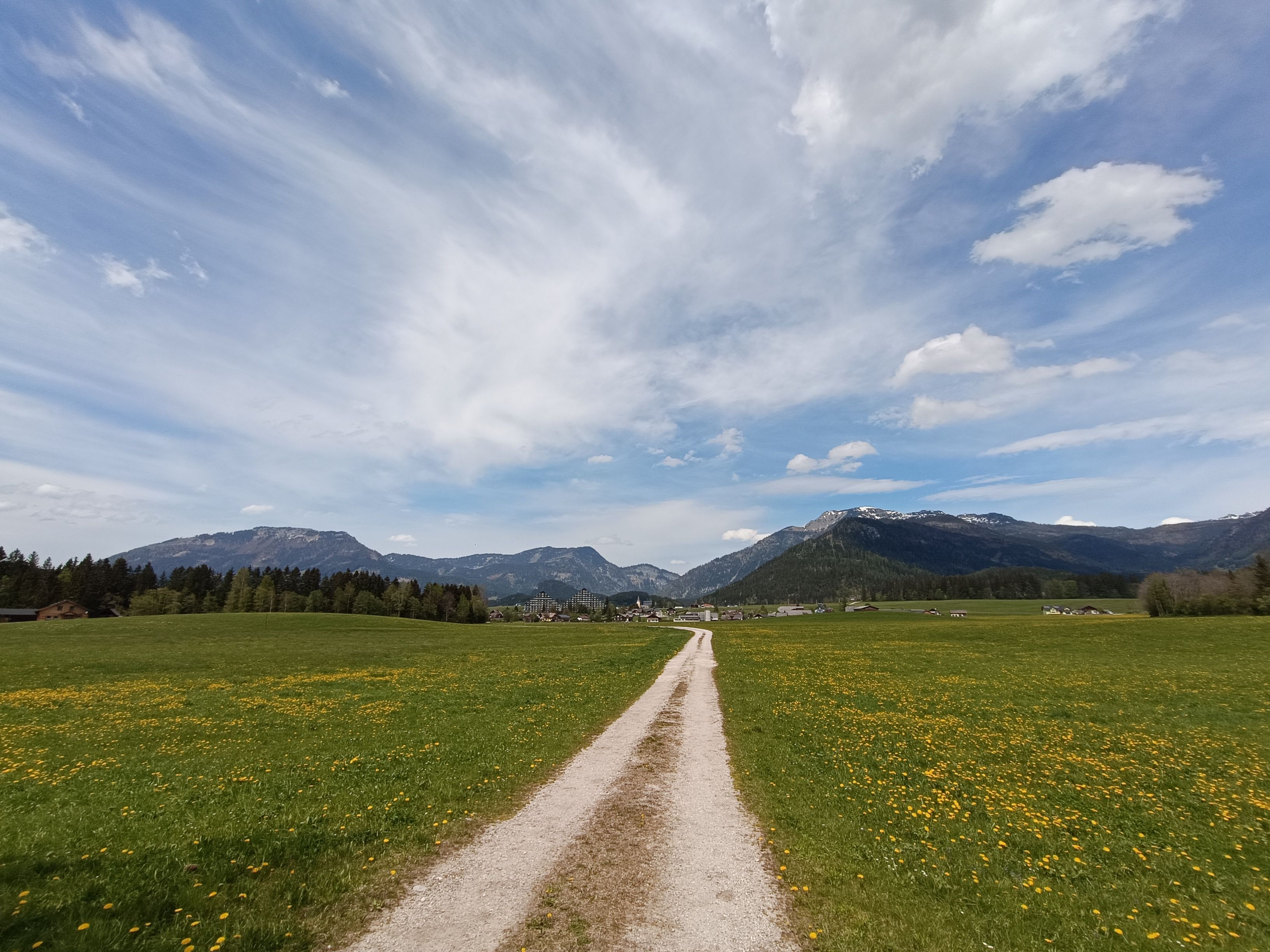 Scenic Mountain Path under Dramatic Sky · Free Stock Photo